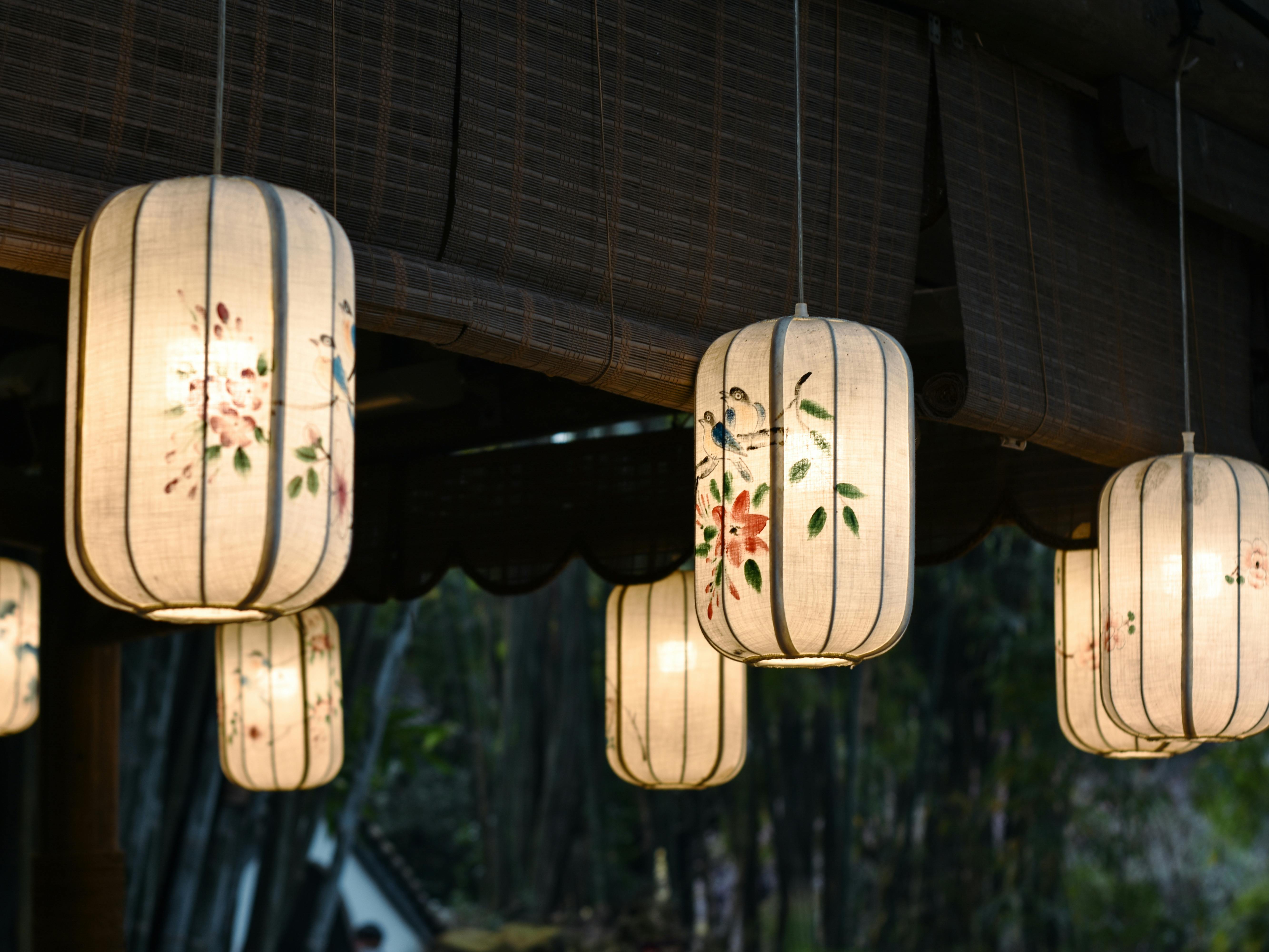 Three Multicolored Floral Pendant Lanterns · Free Stock Photo