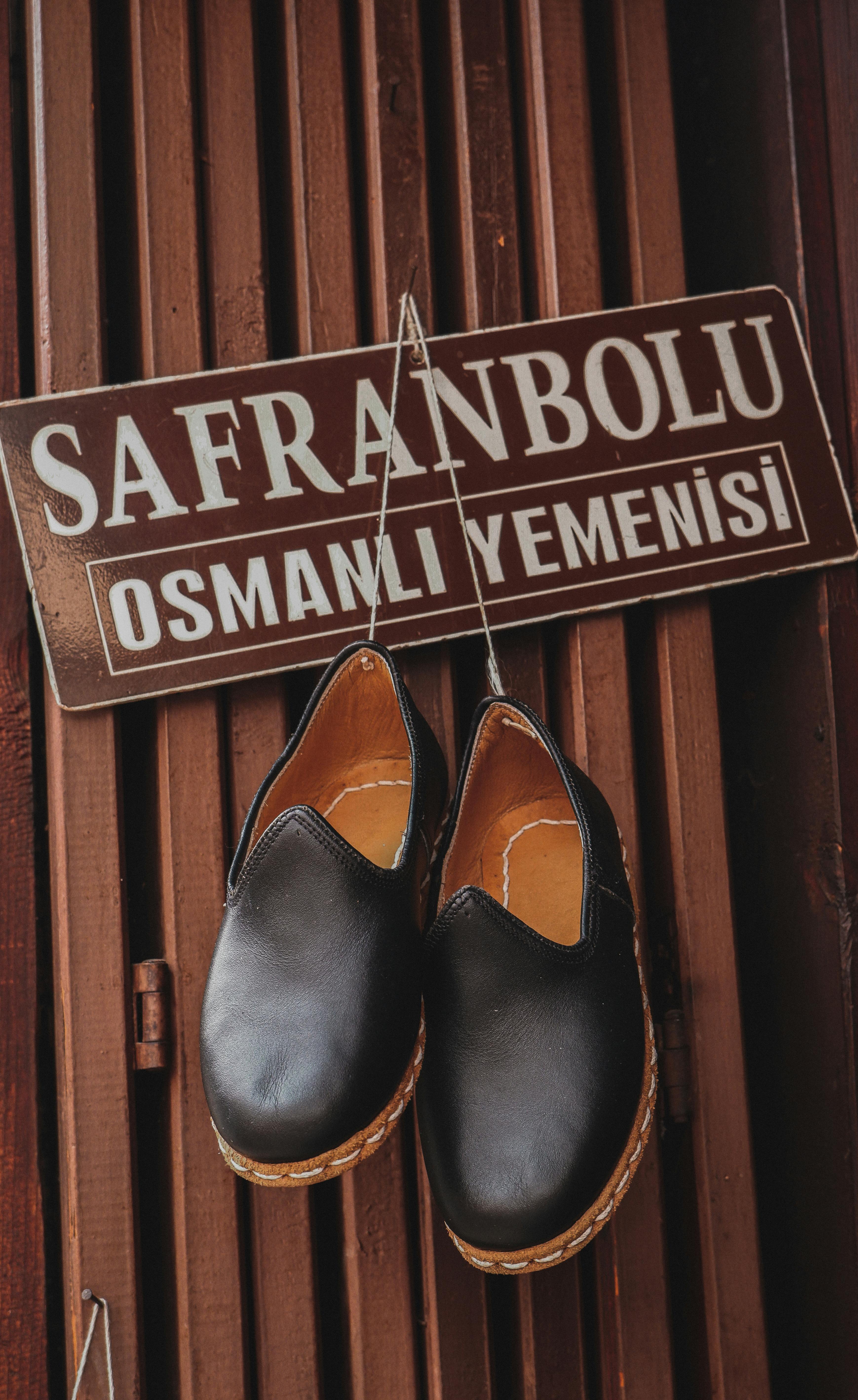 Shoes Hanging on the Wall · Free Stock Photo