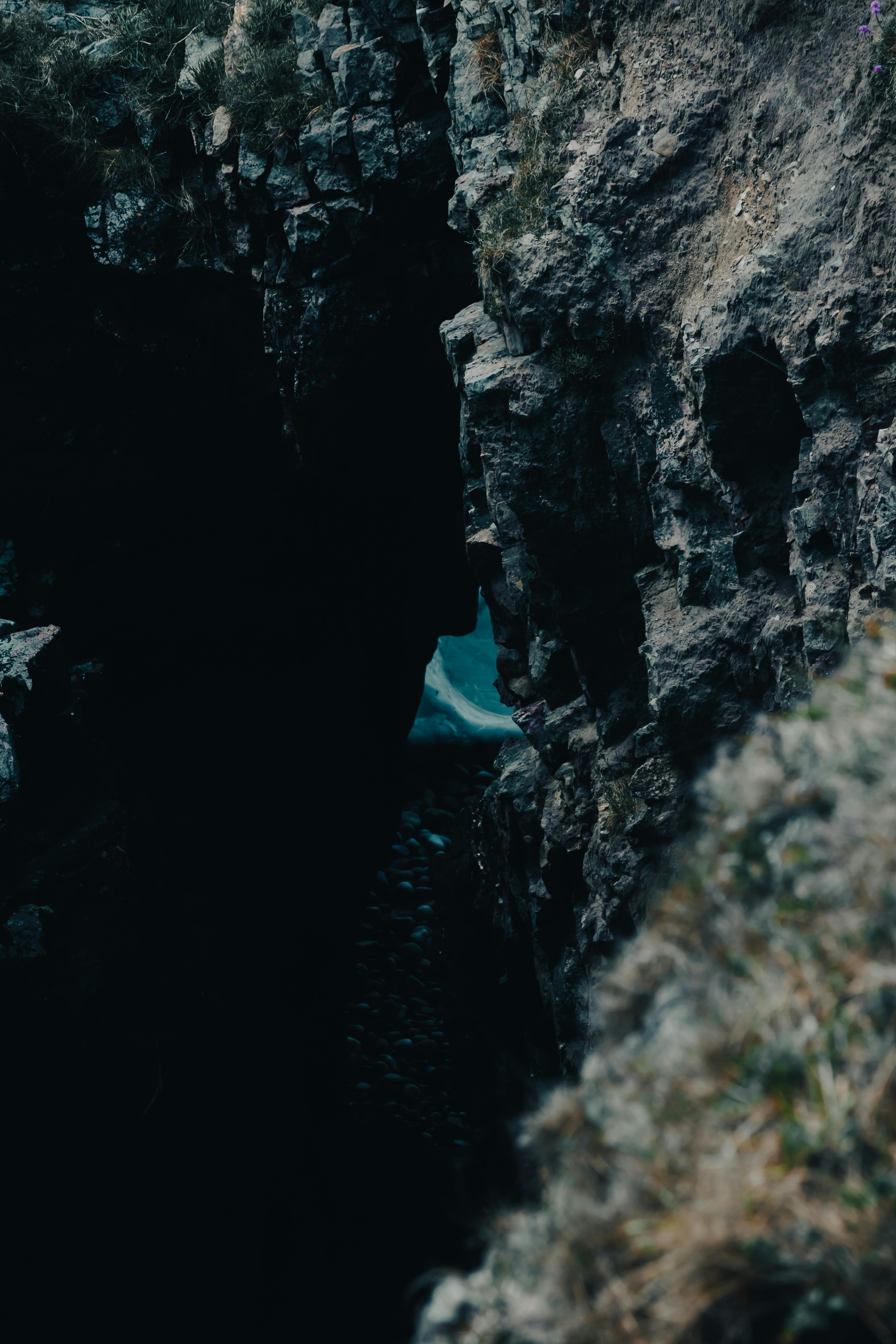 Cave in Cliff near Ocean · Free Stock Photo