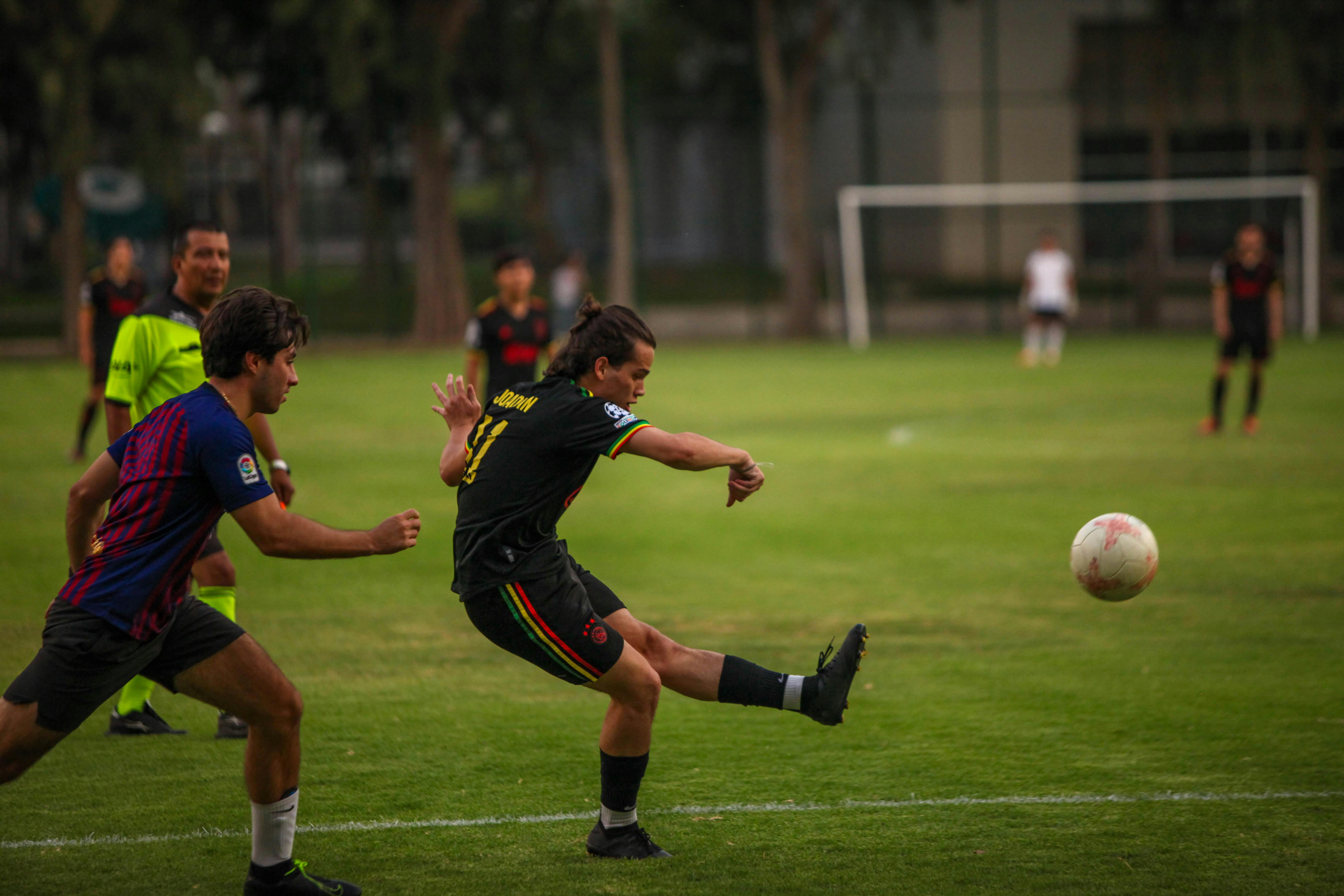 Photo of a Man Playing Soccer · Free Stock Photo