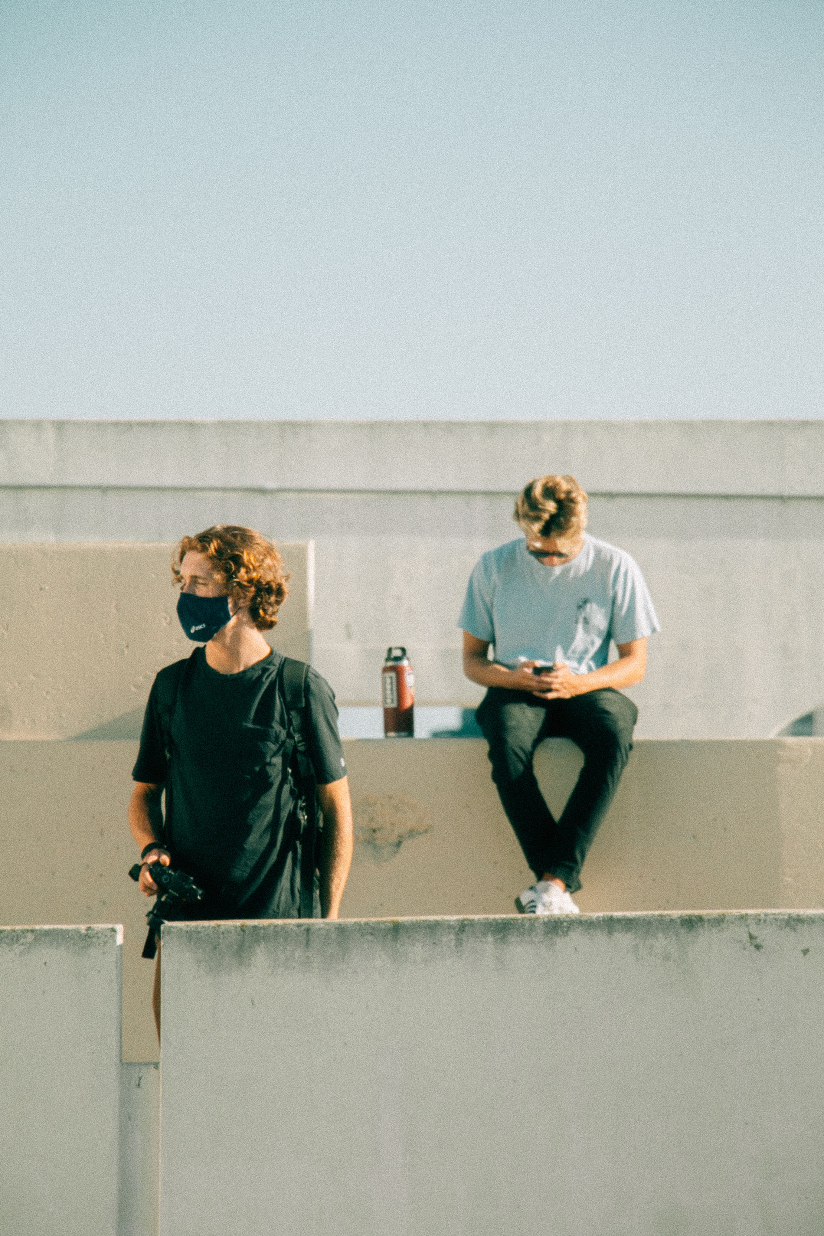Guys in Face Masks on Stairs · Free Stock Photo