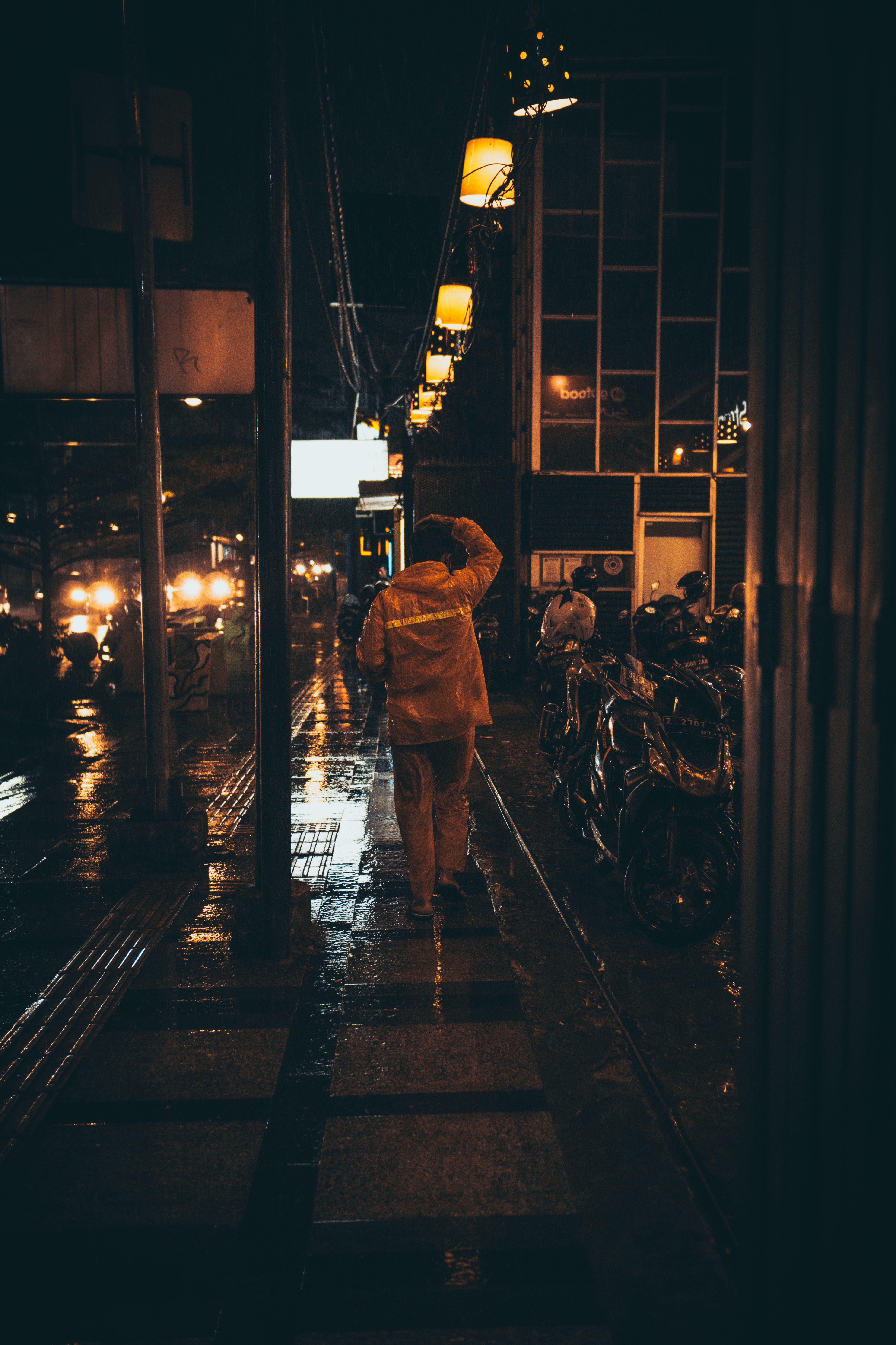 Man Walking Down a Road at Night · Free Stock Photo