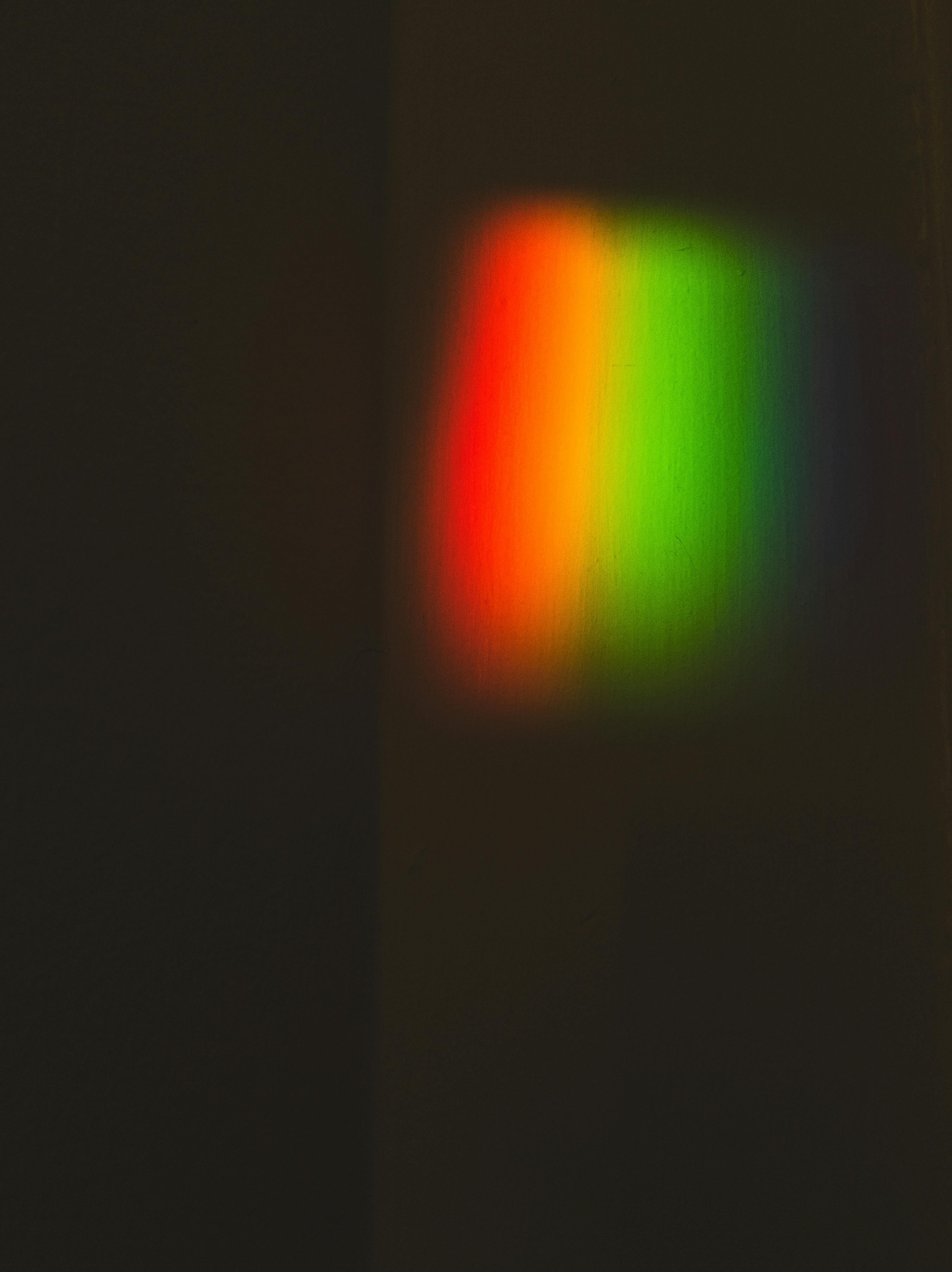 Red and Green Light Shining on Dark Wall · Free Stock Photo