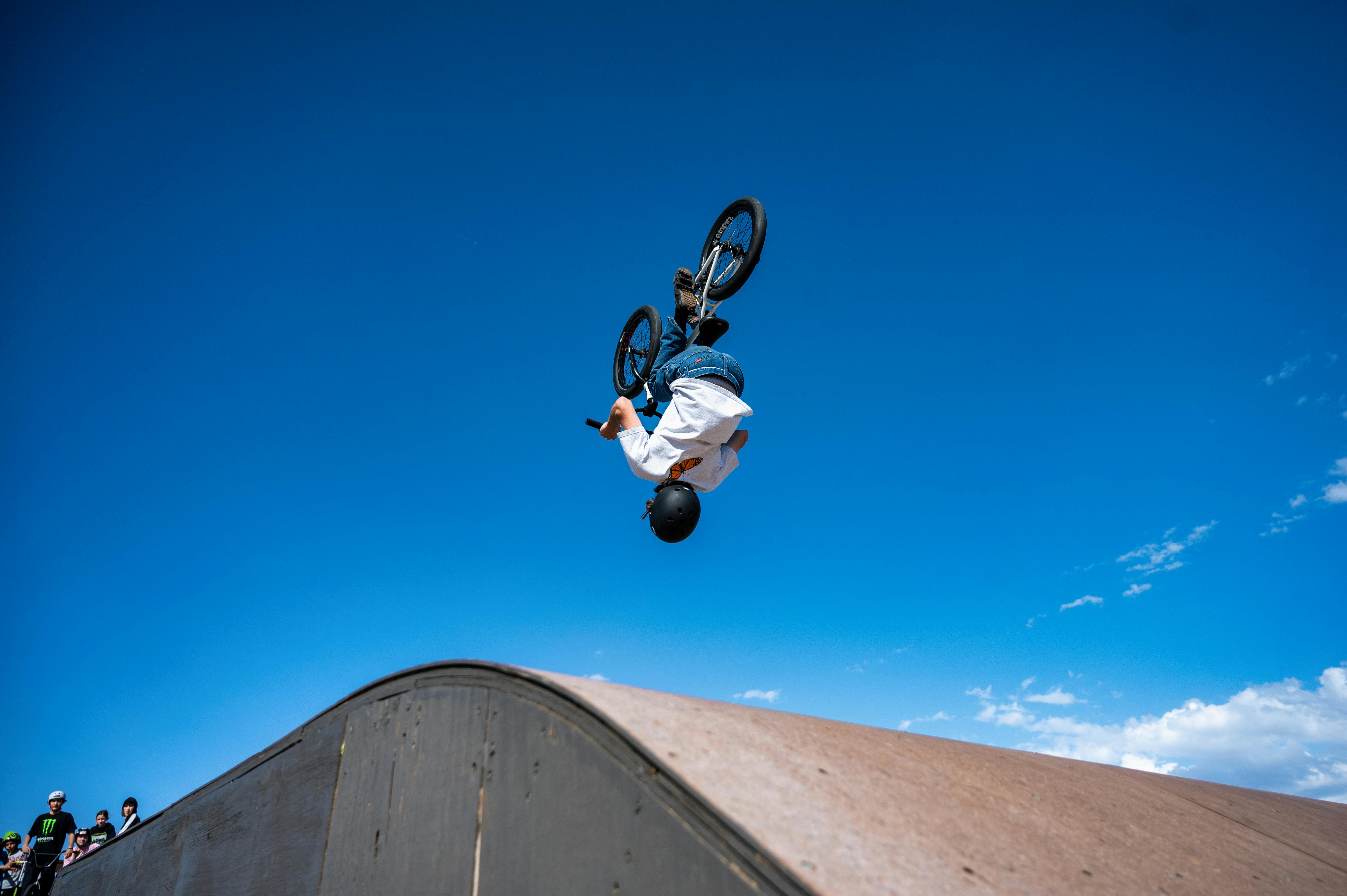 A Person Doing a Bicycle Stunt · Free Stock Photo