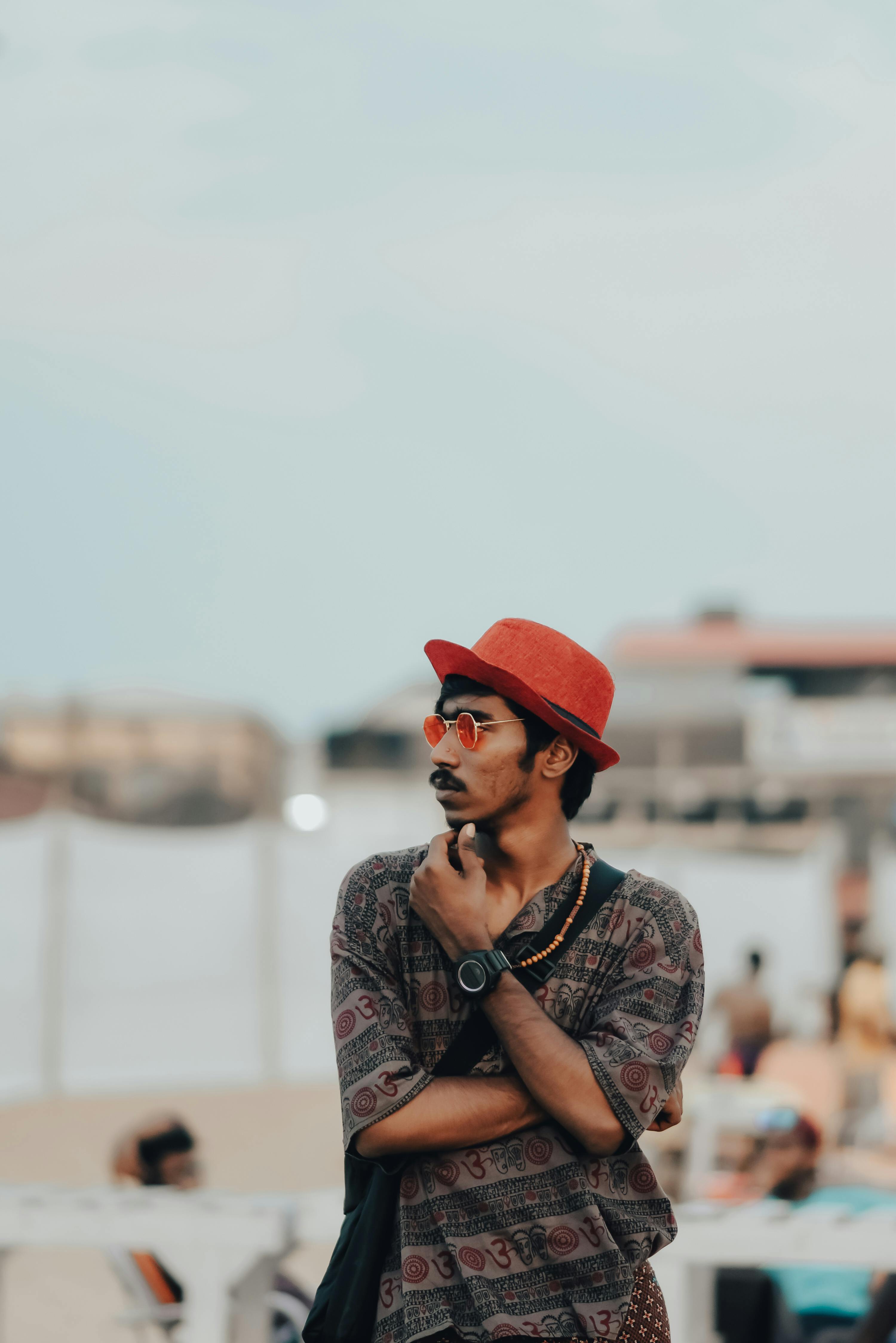 Photo of a Man Wearing a Red Hat · Free Stock Photo