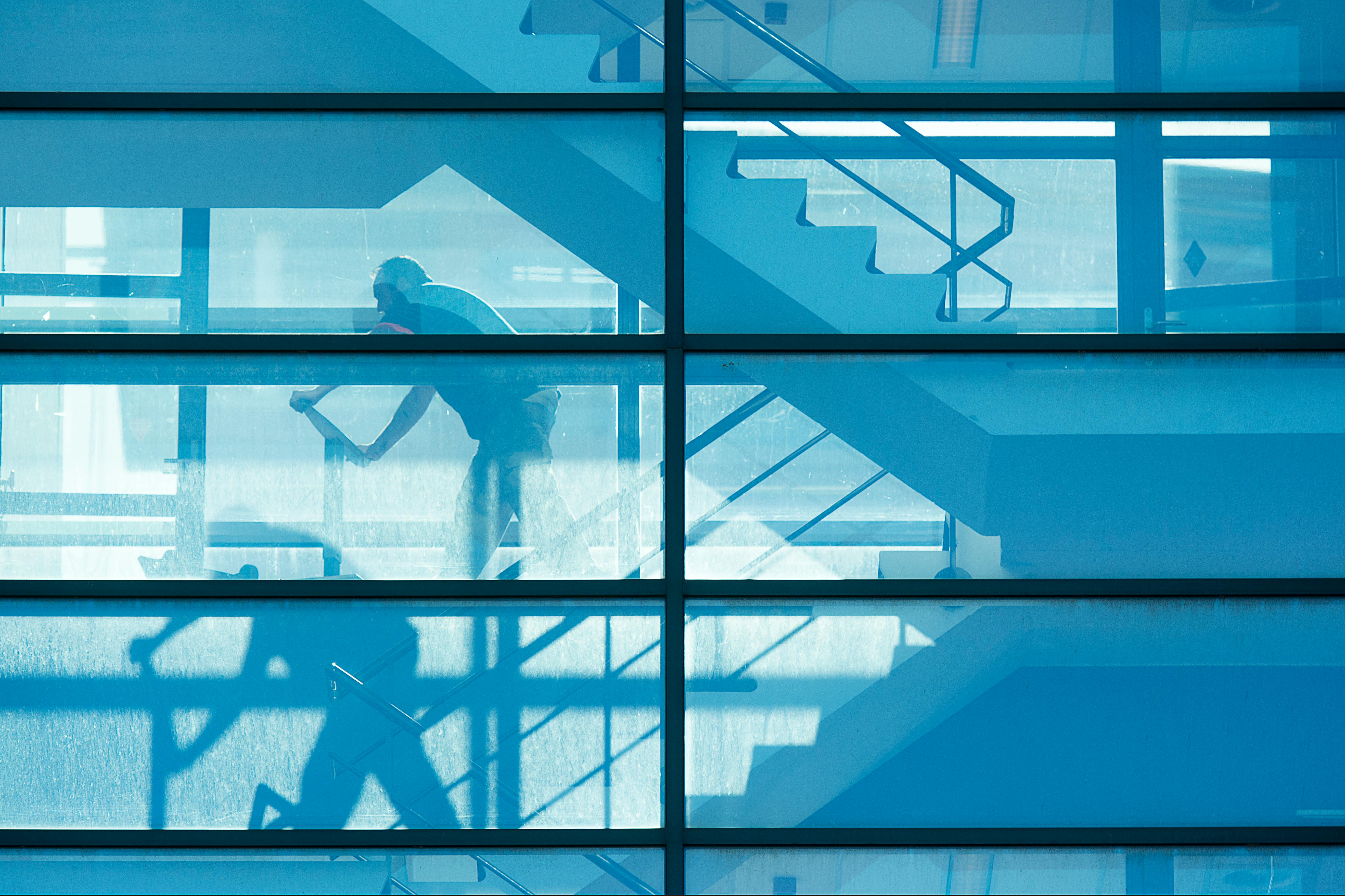 A Staircase Behind a Window · Free Stock Photo