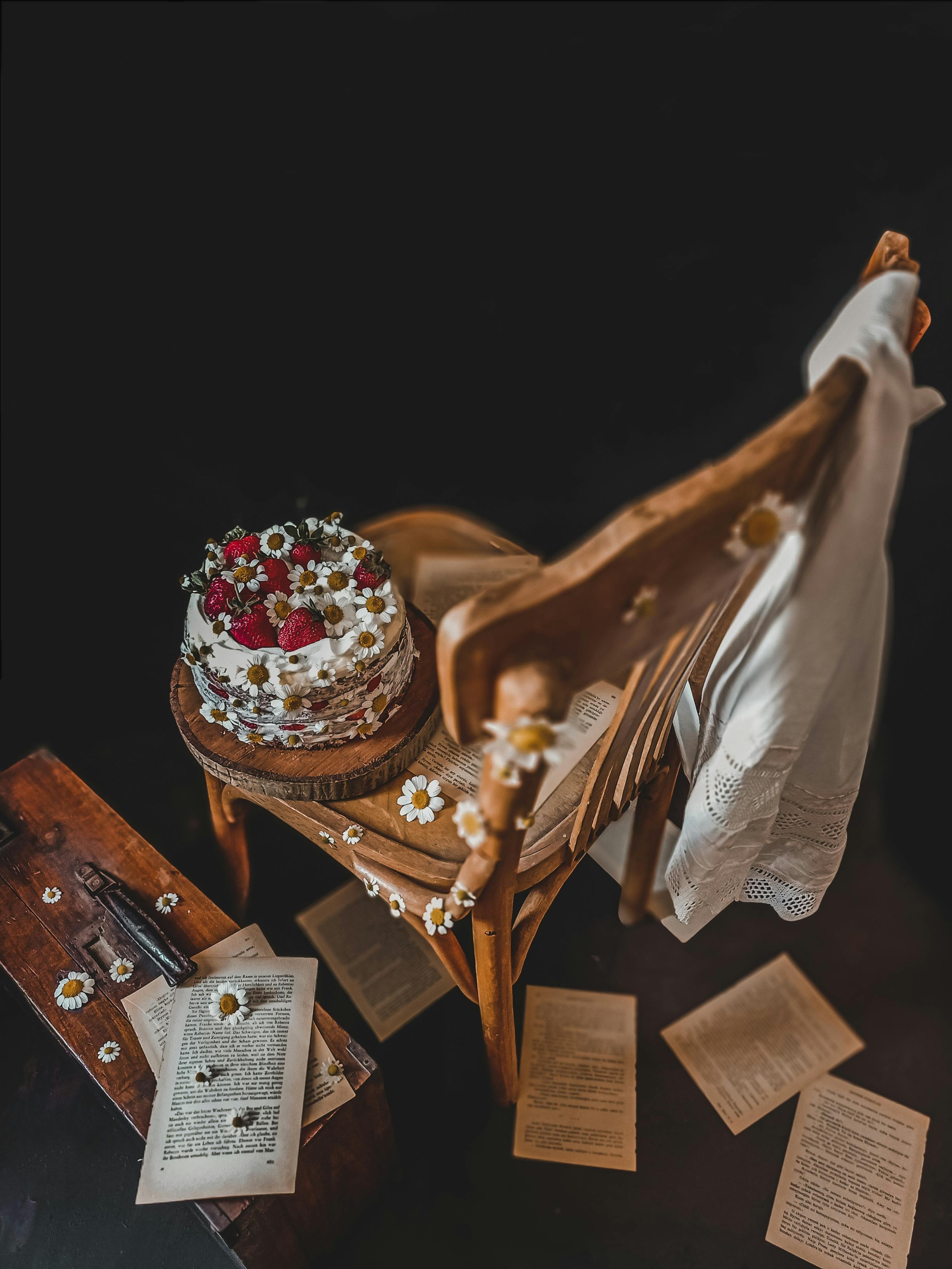 A Chair with a Cake and Flowers · Free Stock Photo