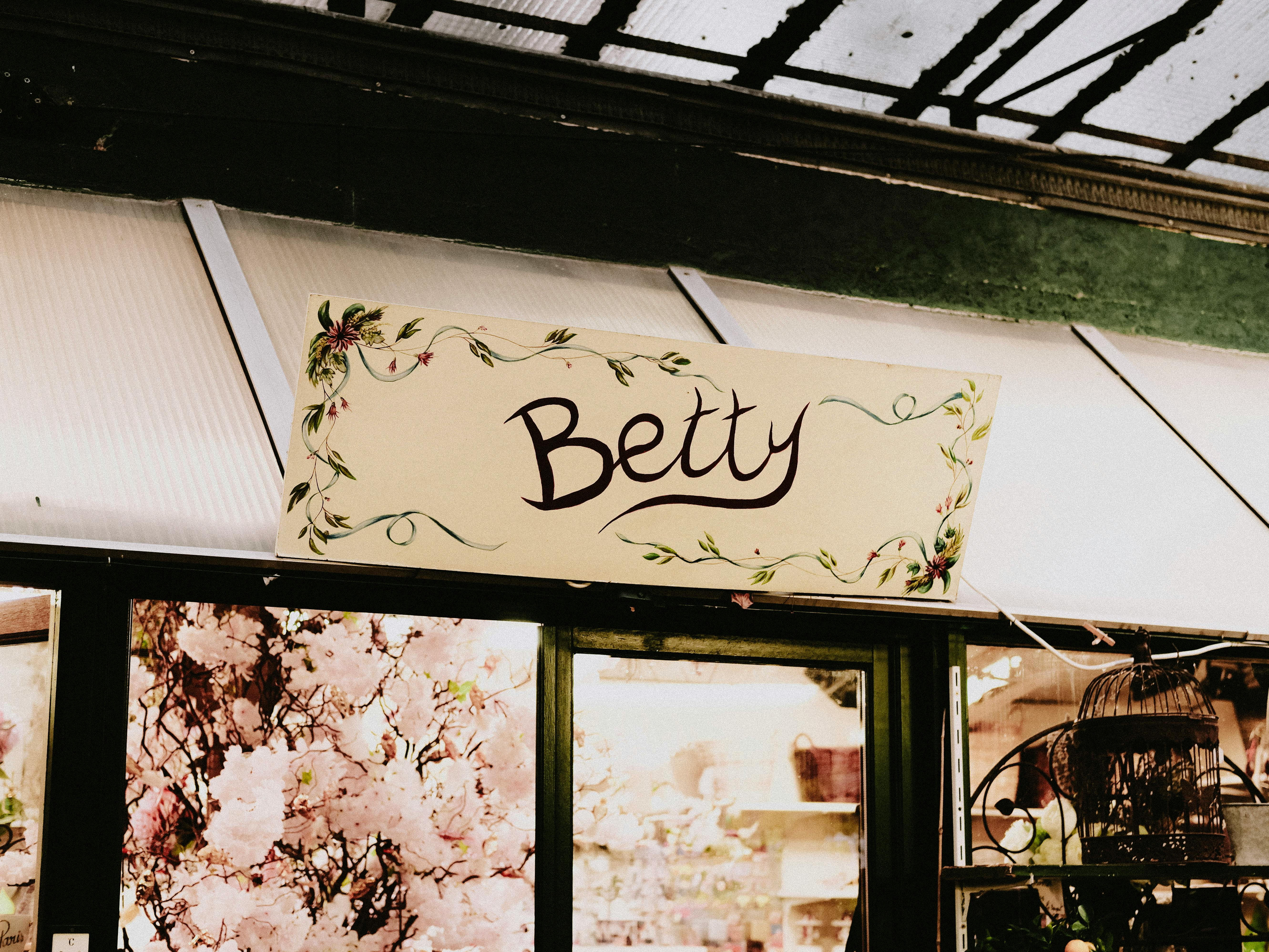 Photo of an Entrance to the Shop with Shop Sign · Free Stock Photo