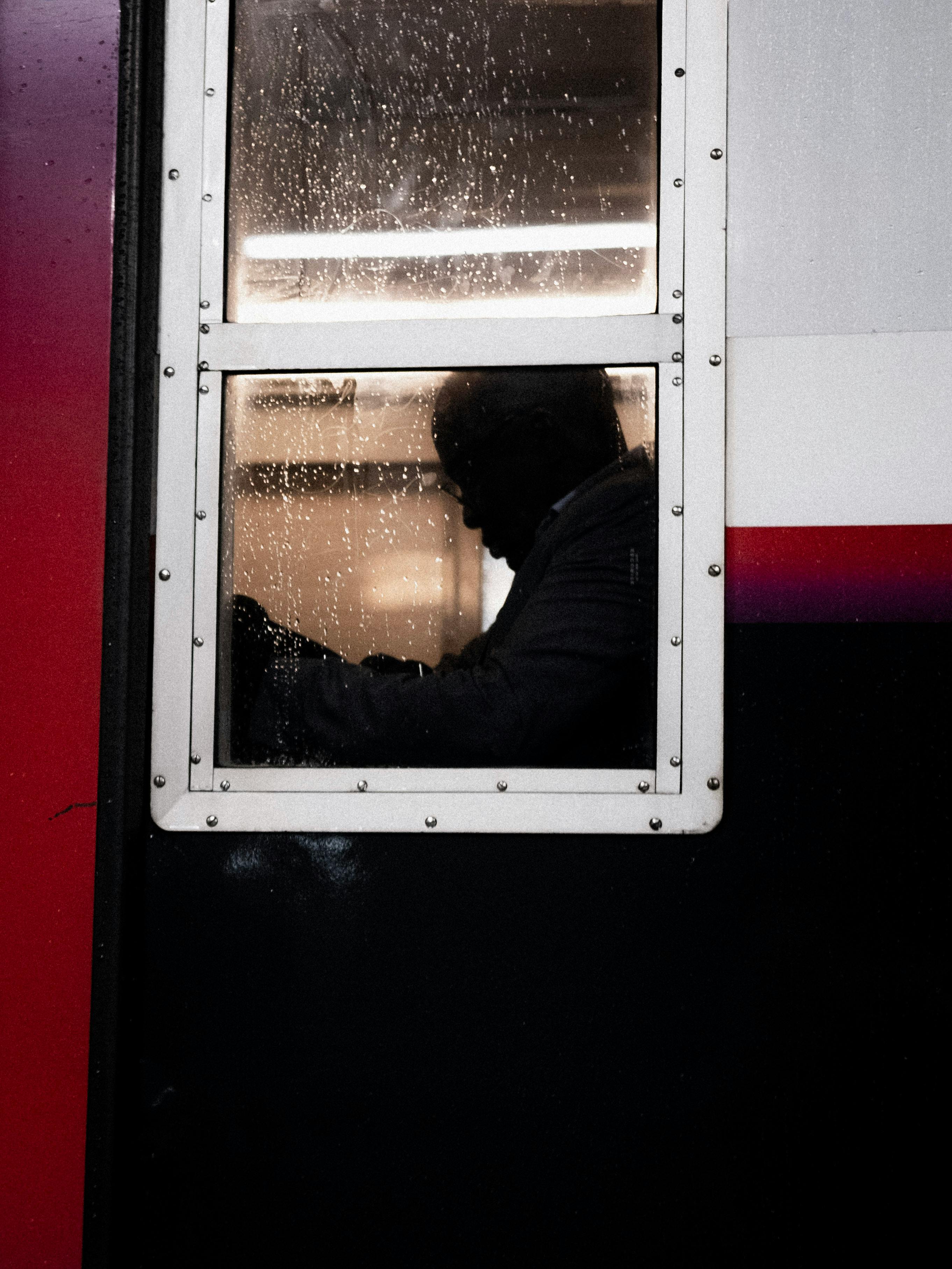 Man and a Woman Sitting inside a Train · Free Stock Photo