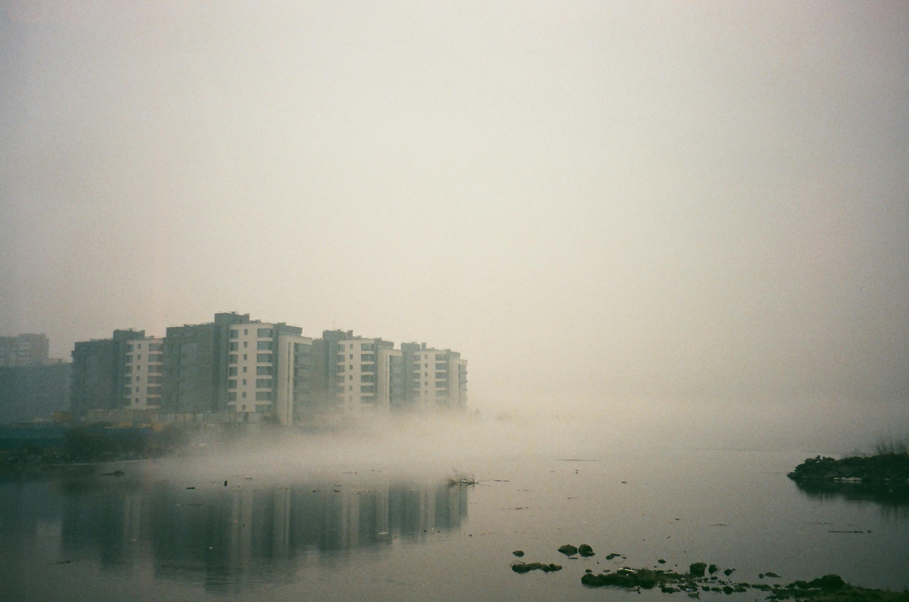 High Rise Buildings Near Body of Water · Free Stock Photo