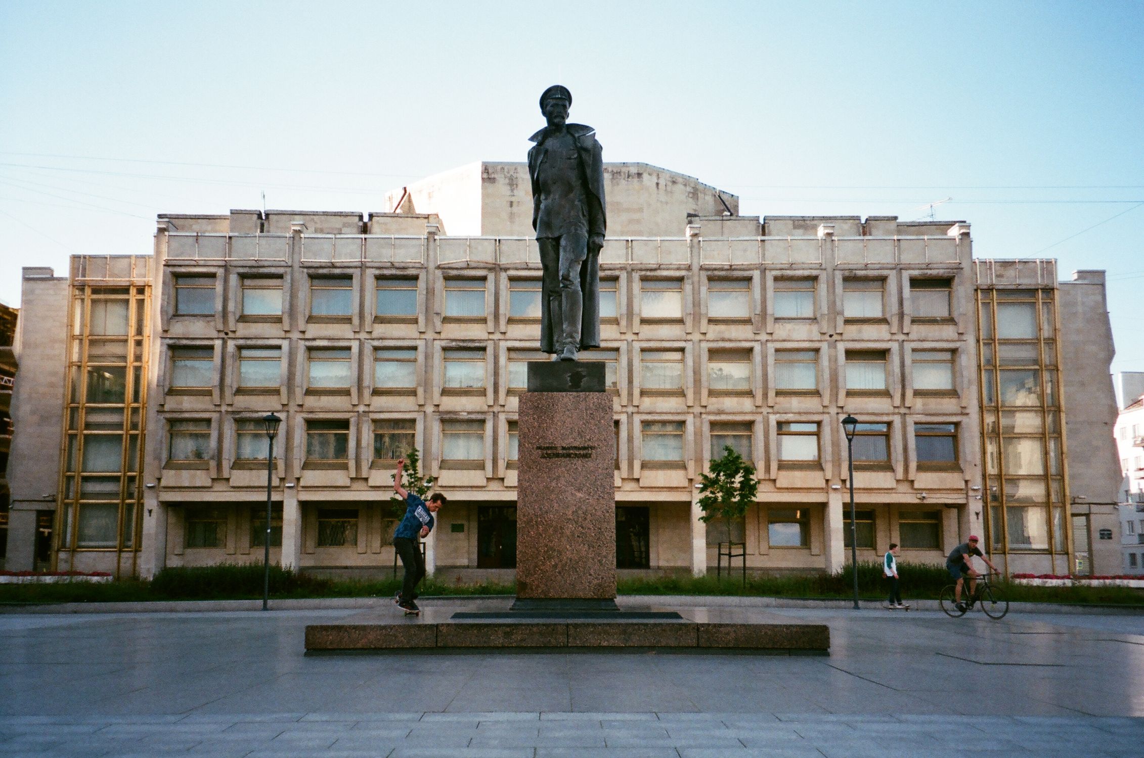 Man Standing Beside Concrete Statue Free Stock Photo Man Standing Beside Concrete Statue Free Stock Photo