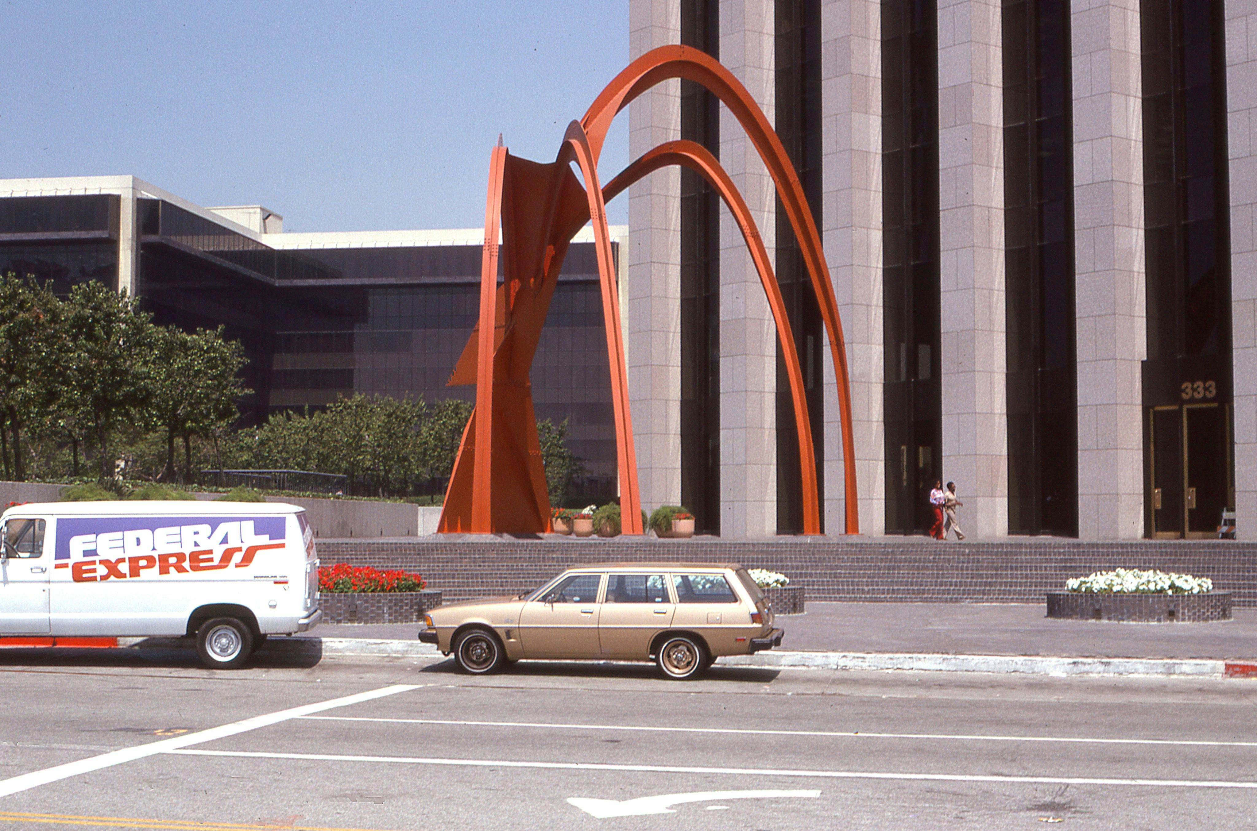 Vintage Photo of Cars Parked near a Building · Free Stock Photo