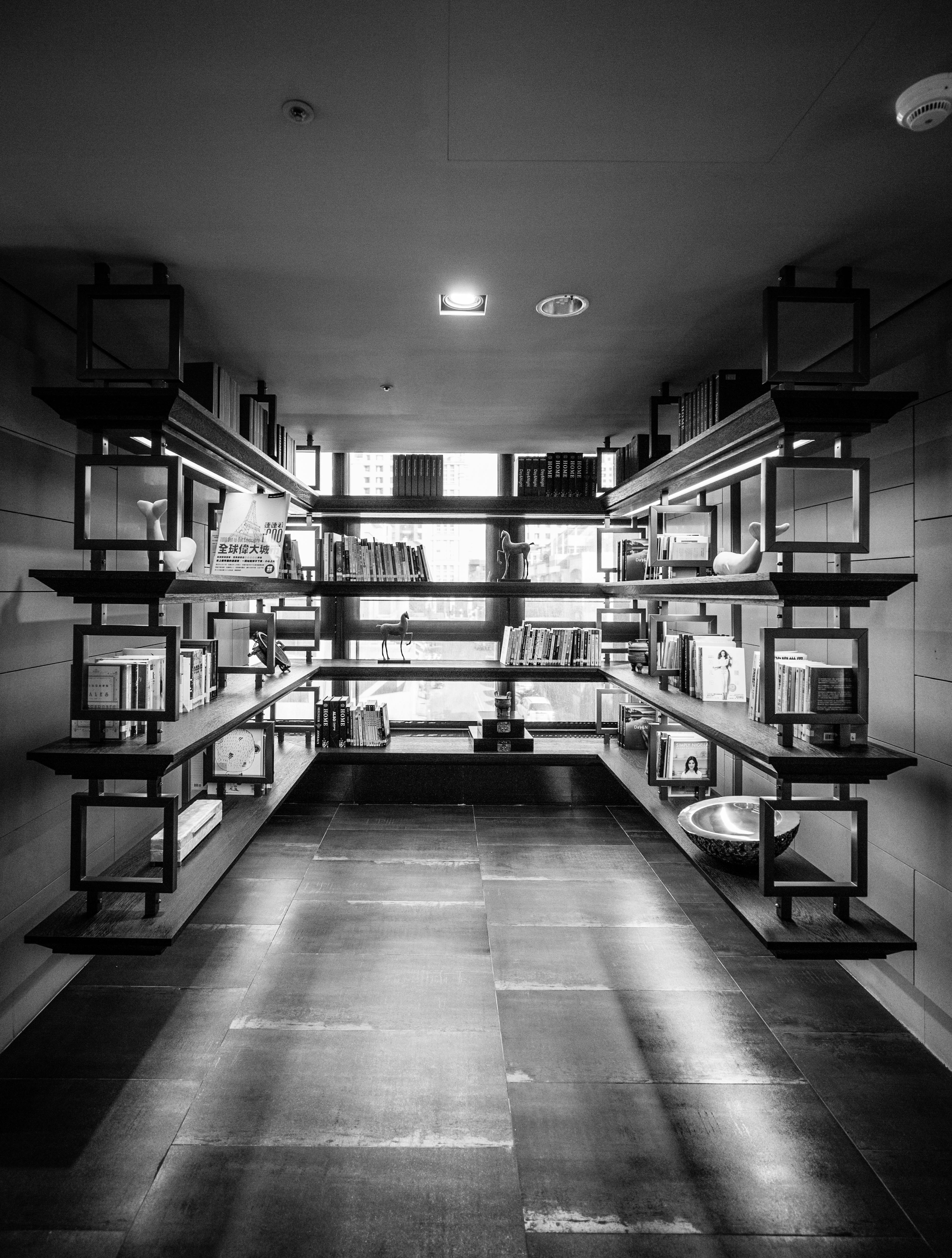 Grayscale Photo of a Library · Free Stock Photo