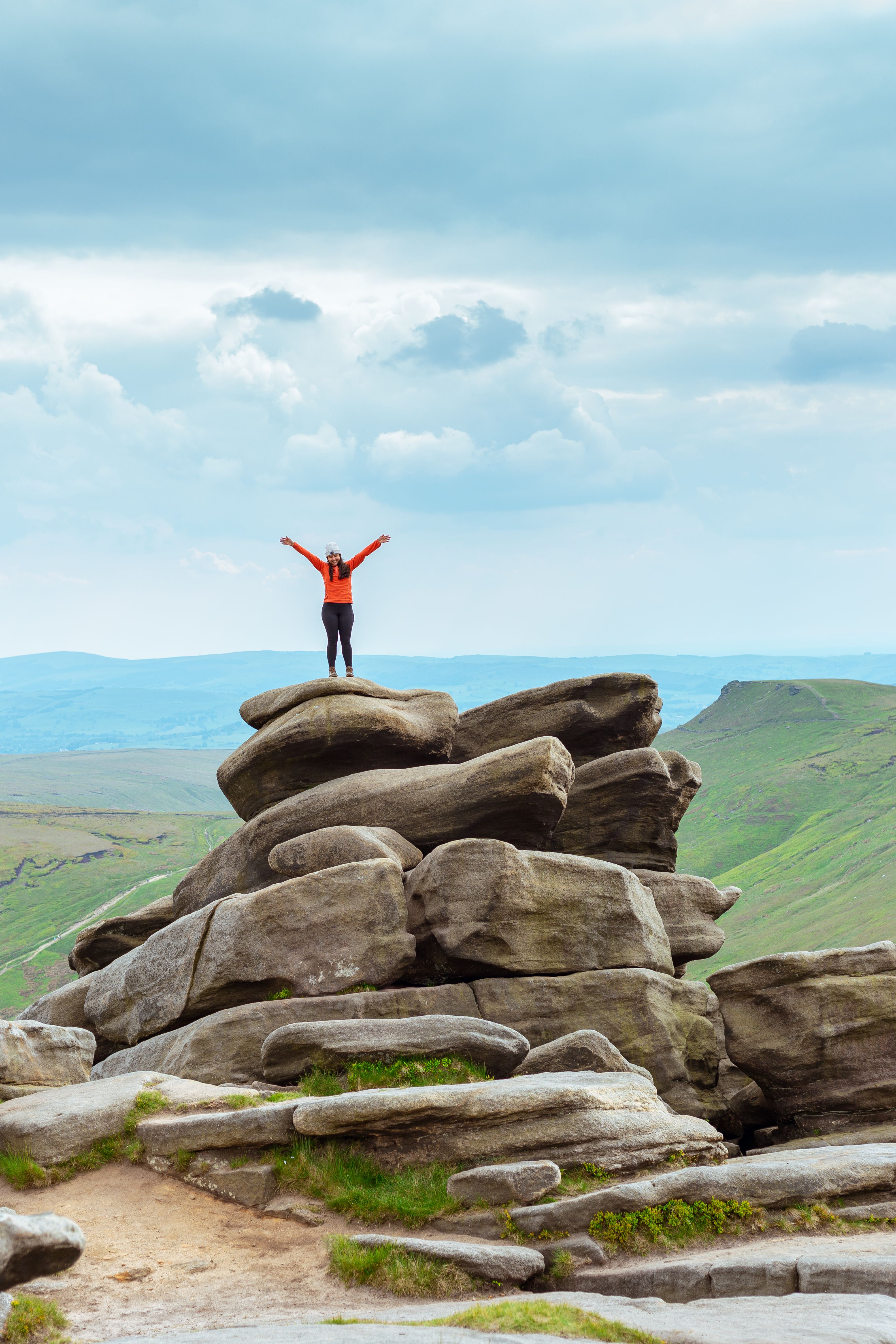 Woman on Top of the Rocks · Free Stock Photo
