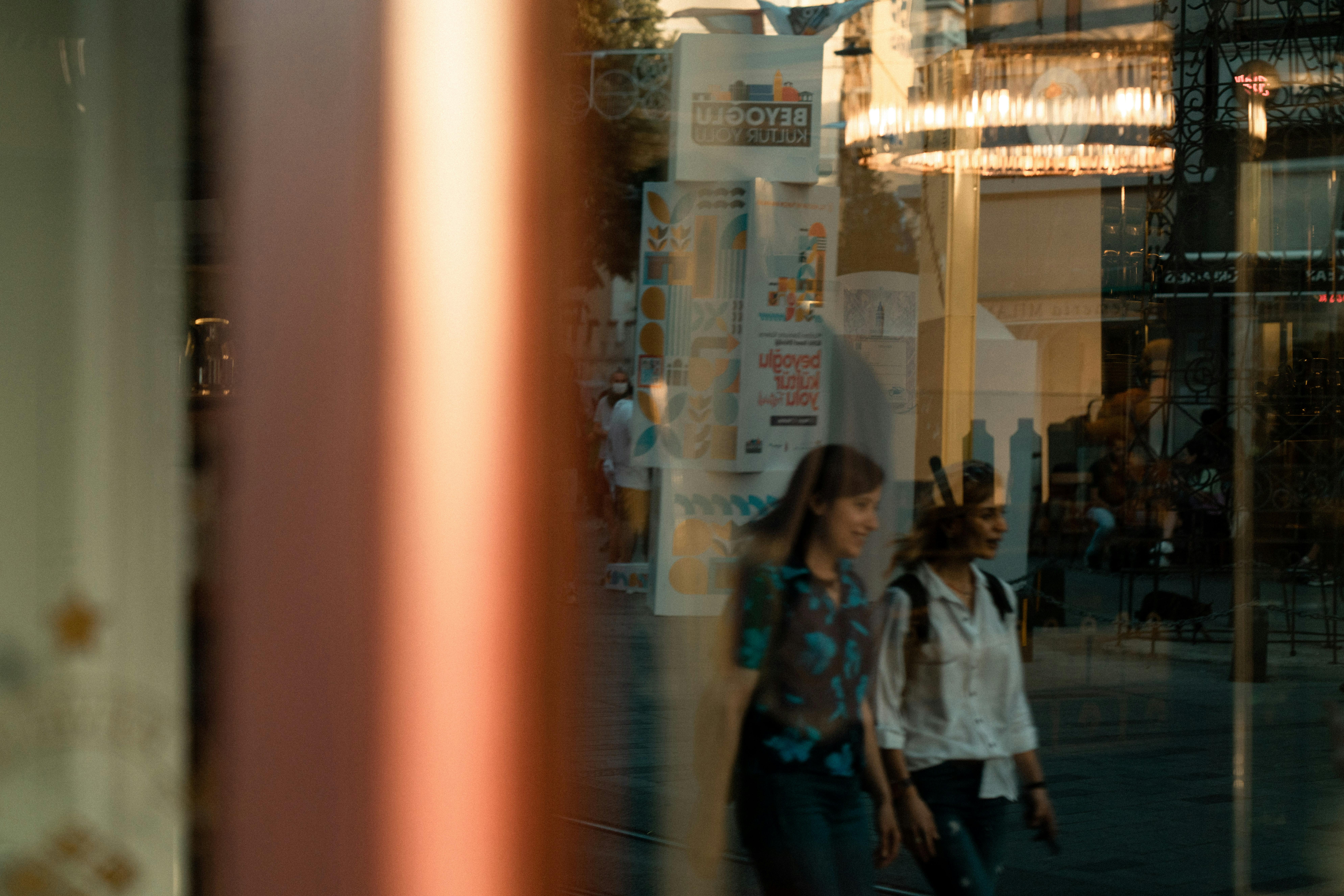 Reflection of People on Glass · Free Stock Photo
