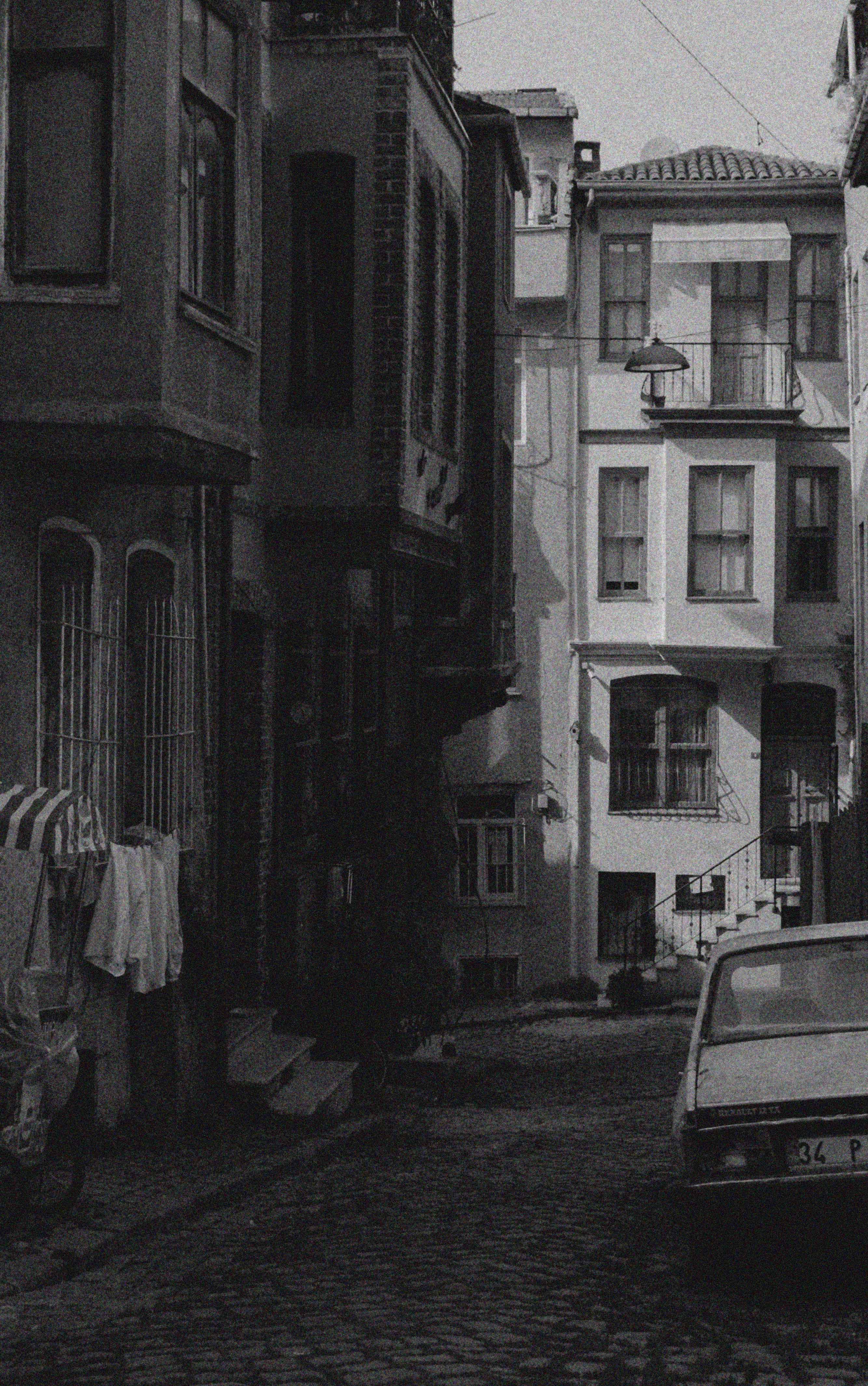 Grayscale Photo of Street with Buildings · Free Stock Photo