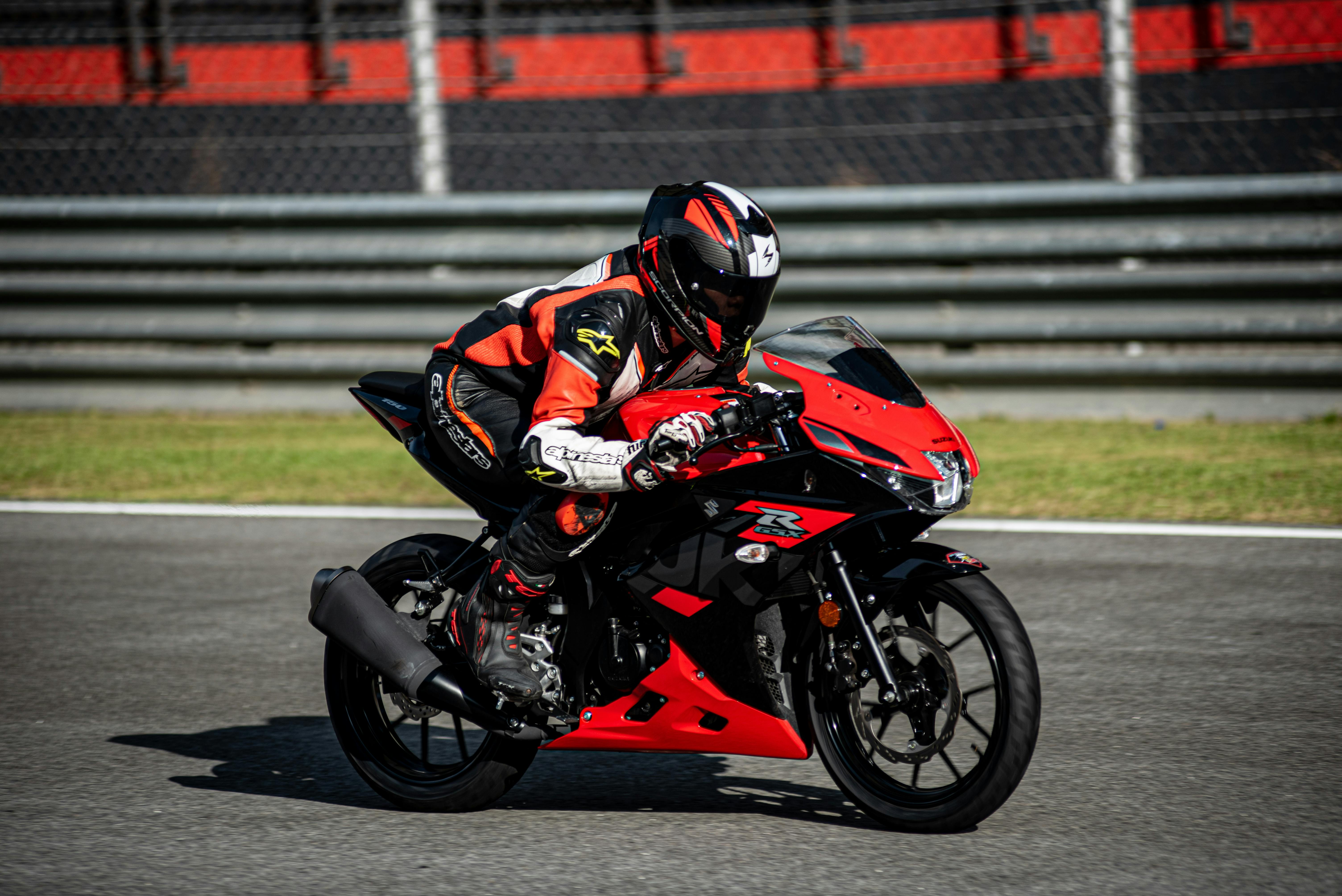 Man Riding Motorcycle on Race Track · Free Stock Photo