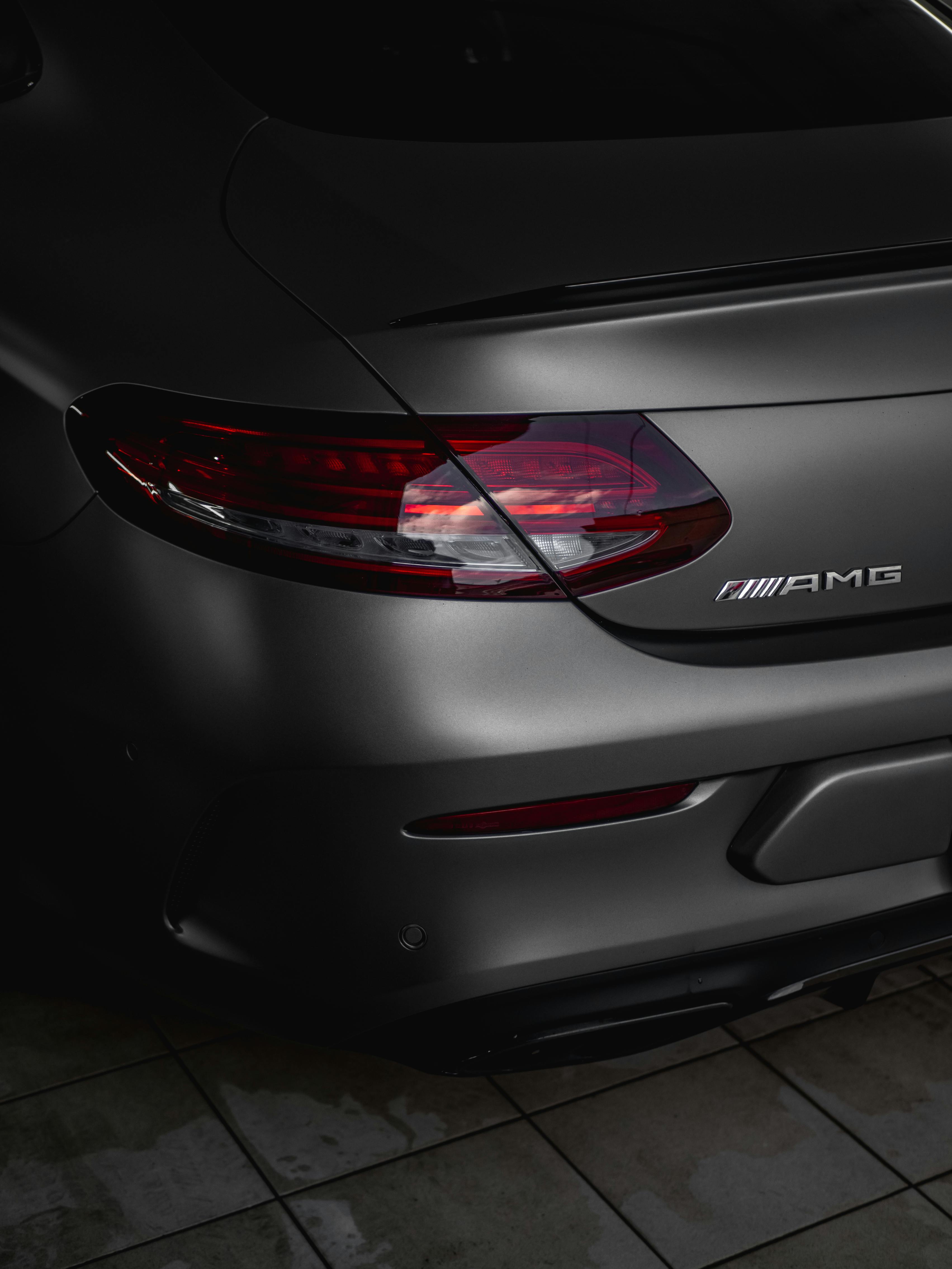 Low-Angle Shot of a White Expensive BMW Car · Free Stock Photo