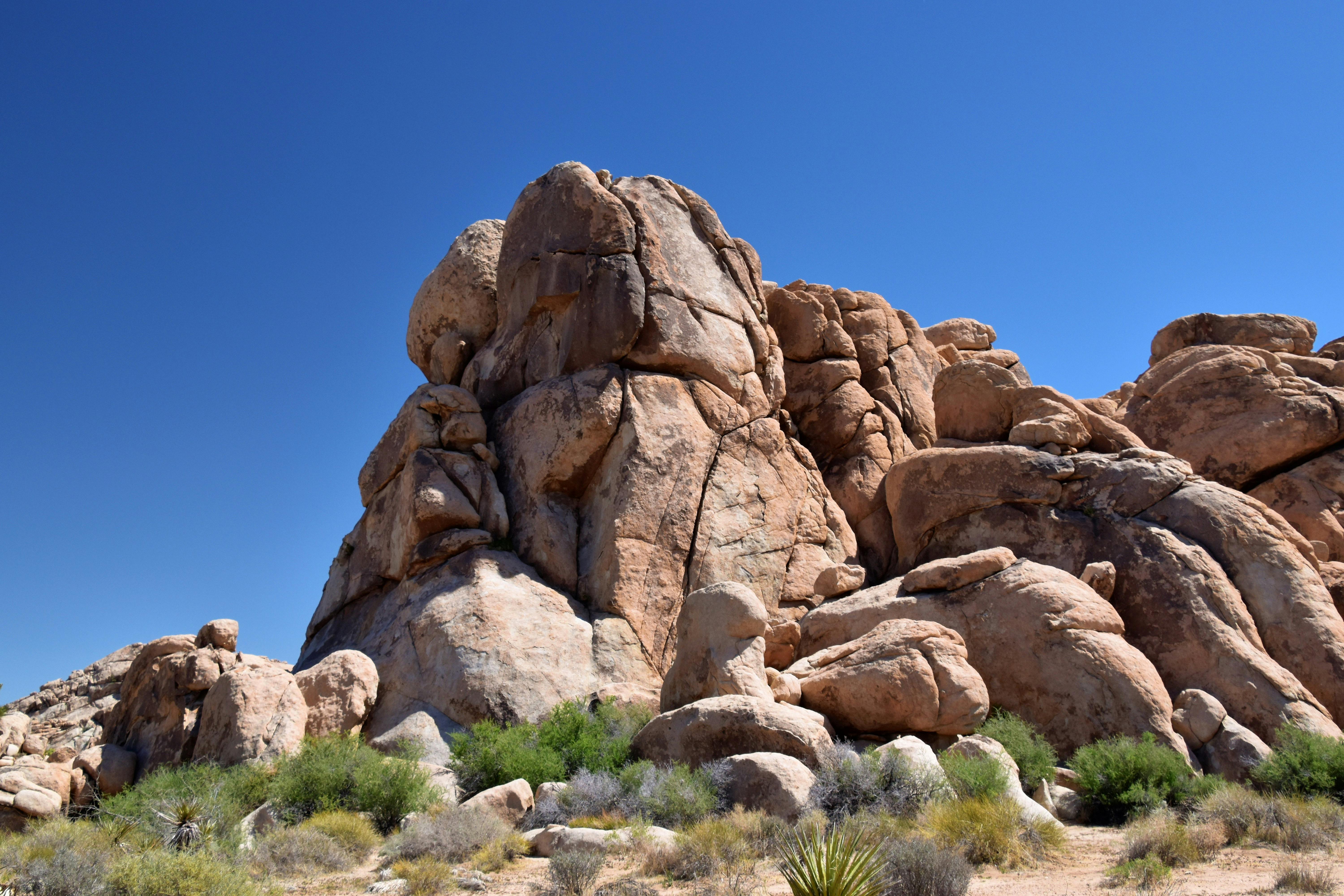 Brown Rocks Formation Under Blue Sky · Free Stock Photo
