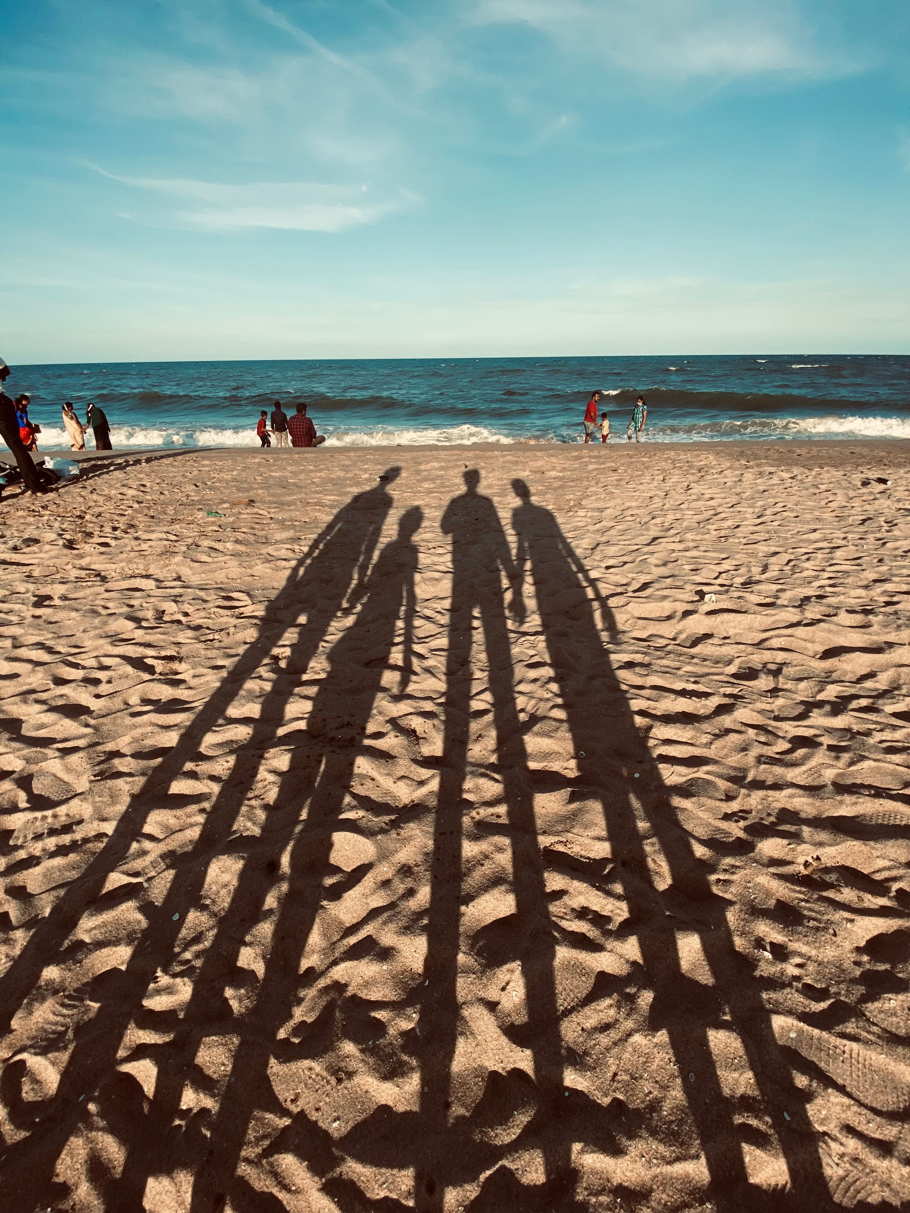Shadows on the Beach Sand · Free Stock Photo