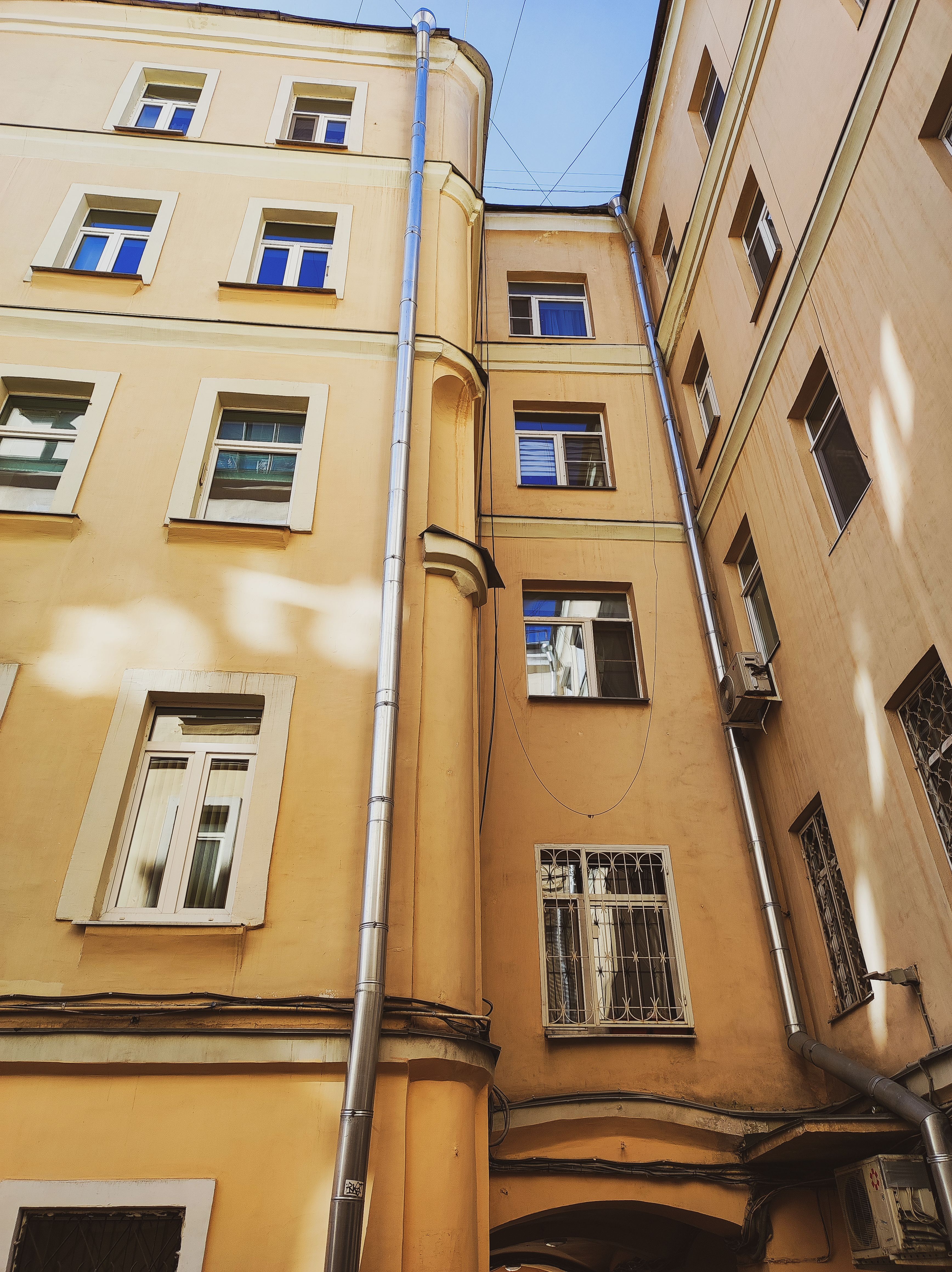 Facade of a Beige Concrete Building · Free Stock Photo