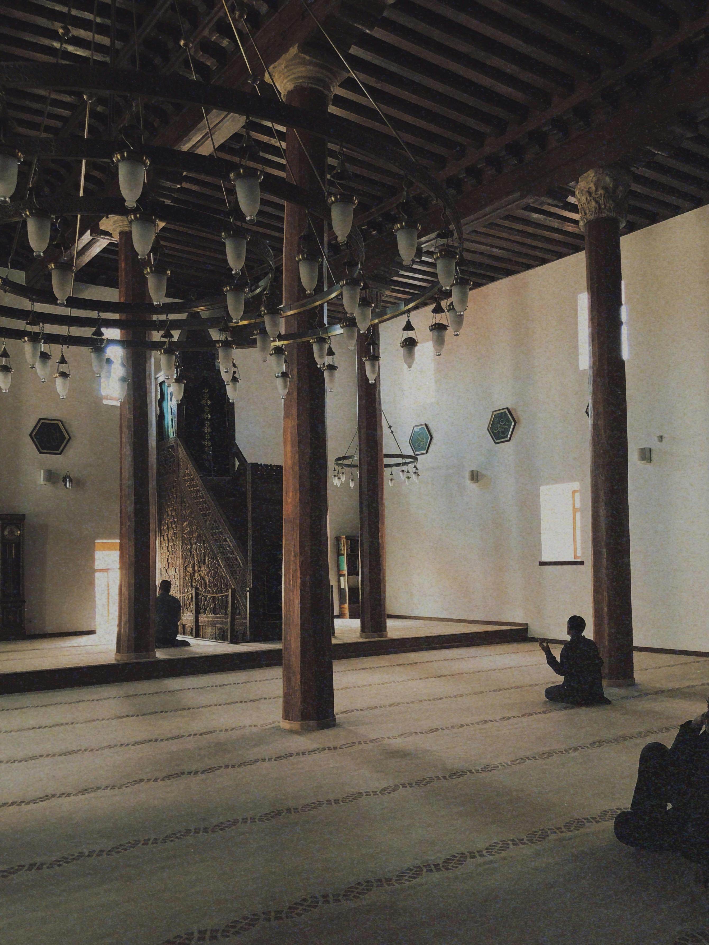People Praying Inside Mosque with Pillars · Free Stock Photo