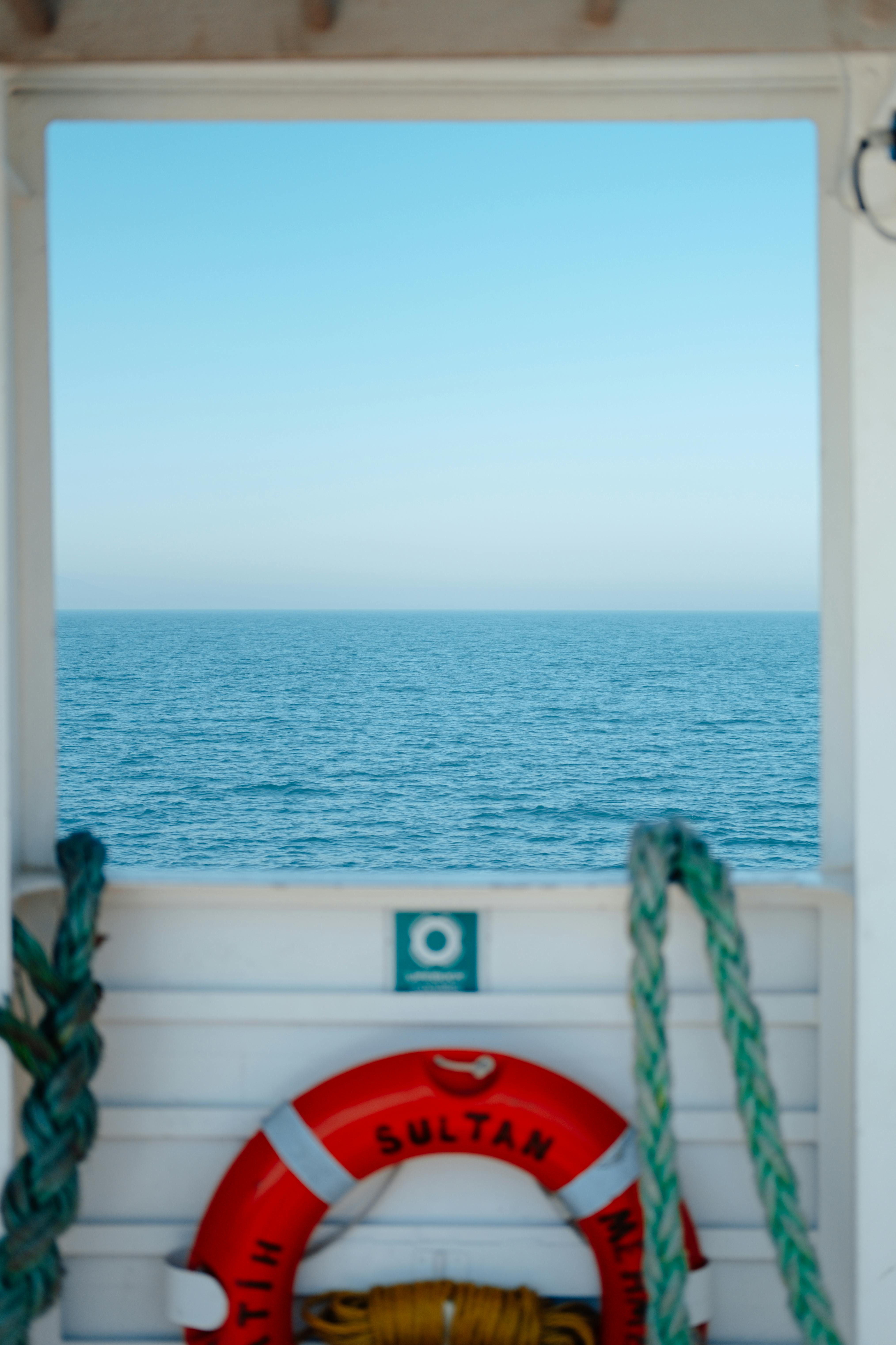View from Ship Window to Open Ocean · Free Stock Photo