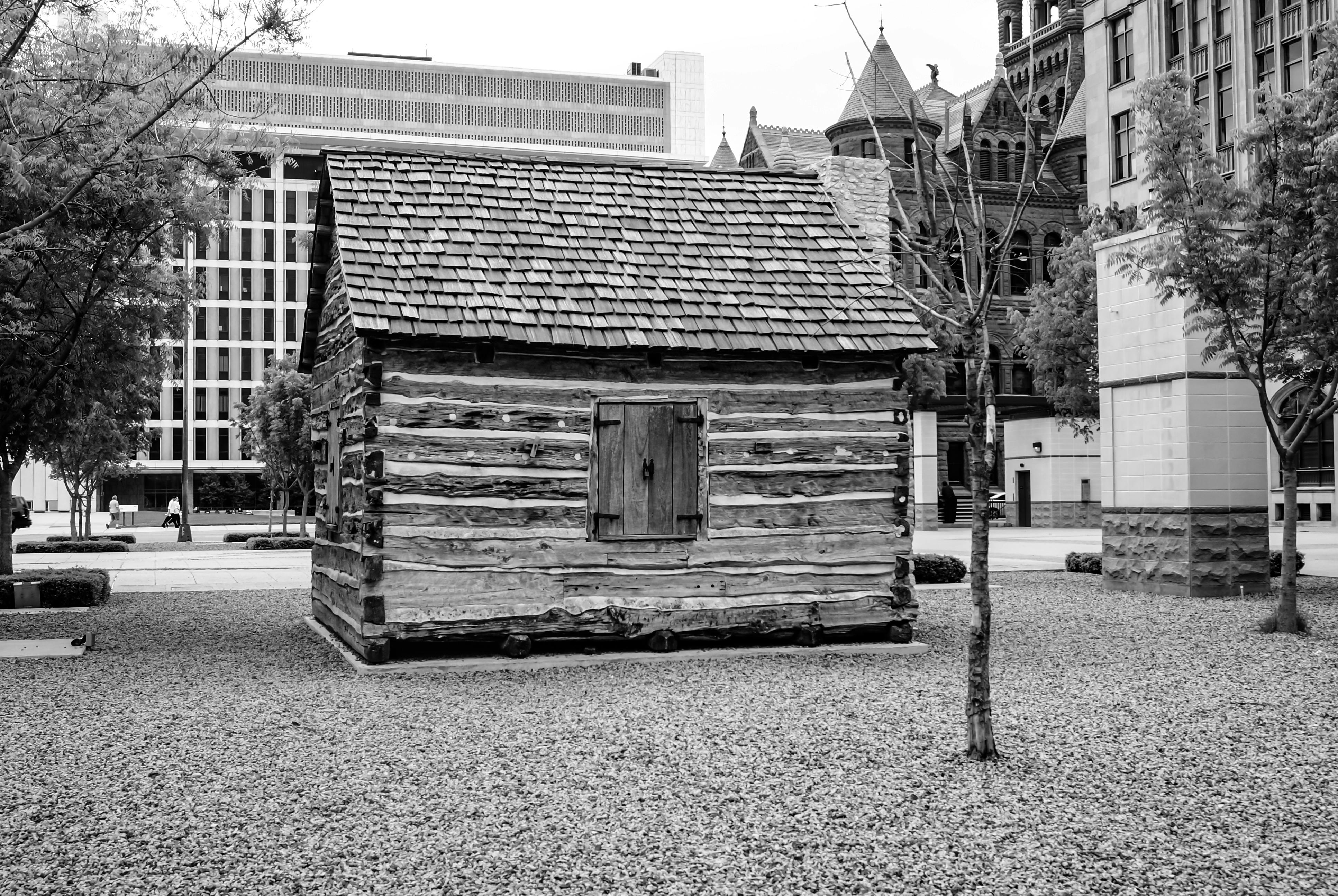 Hut Between Buildings and Trees · Free Stock Photo