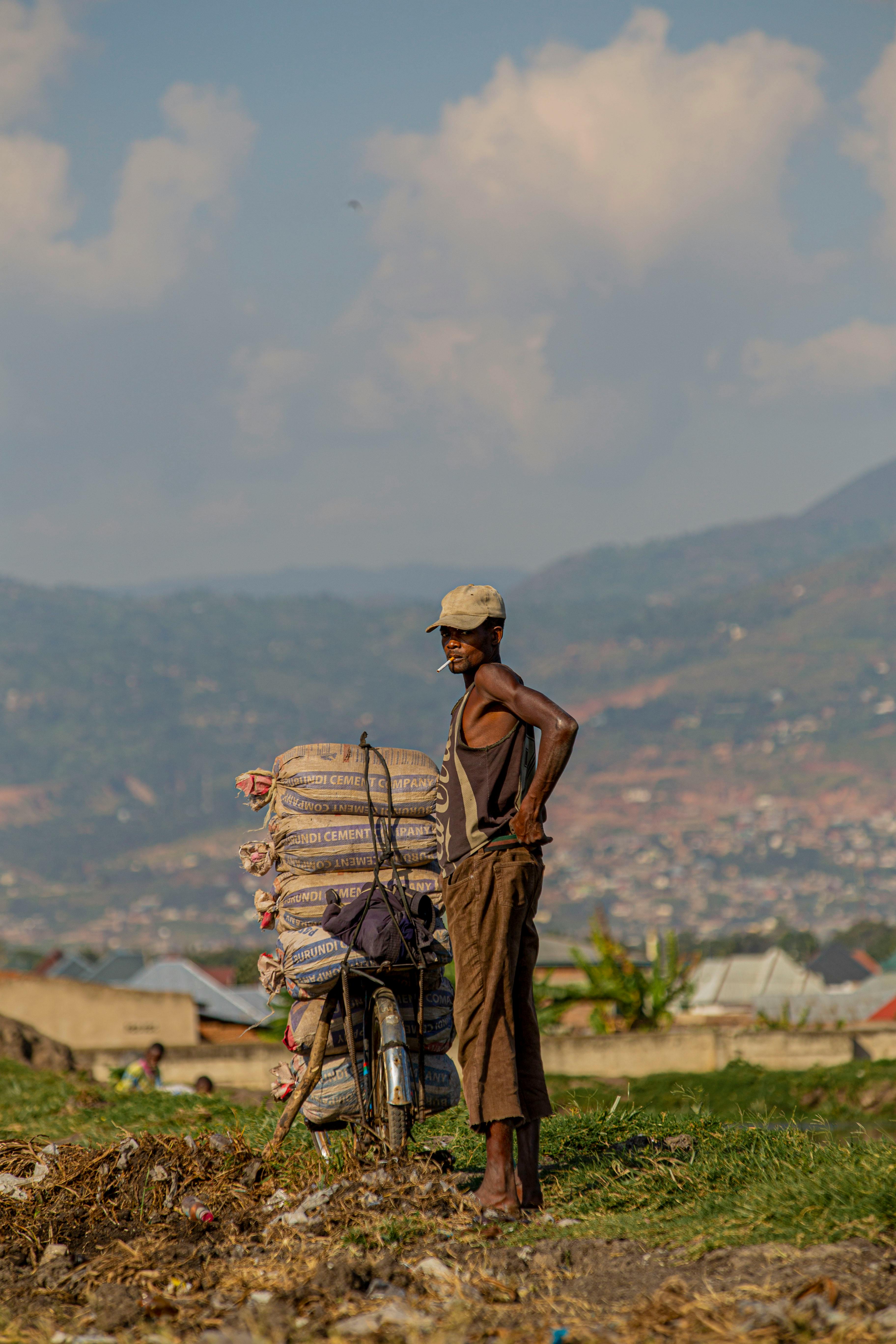 Man Transporting Boxes on Rickshaw · Free Stock Photo