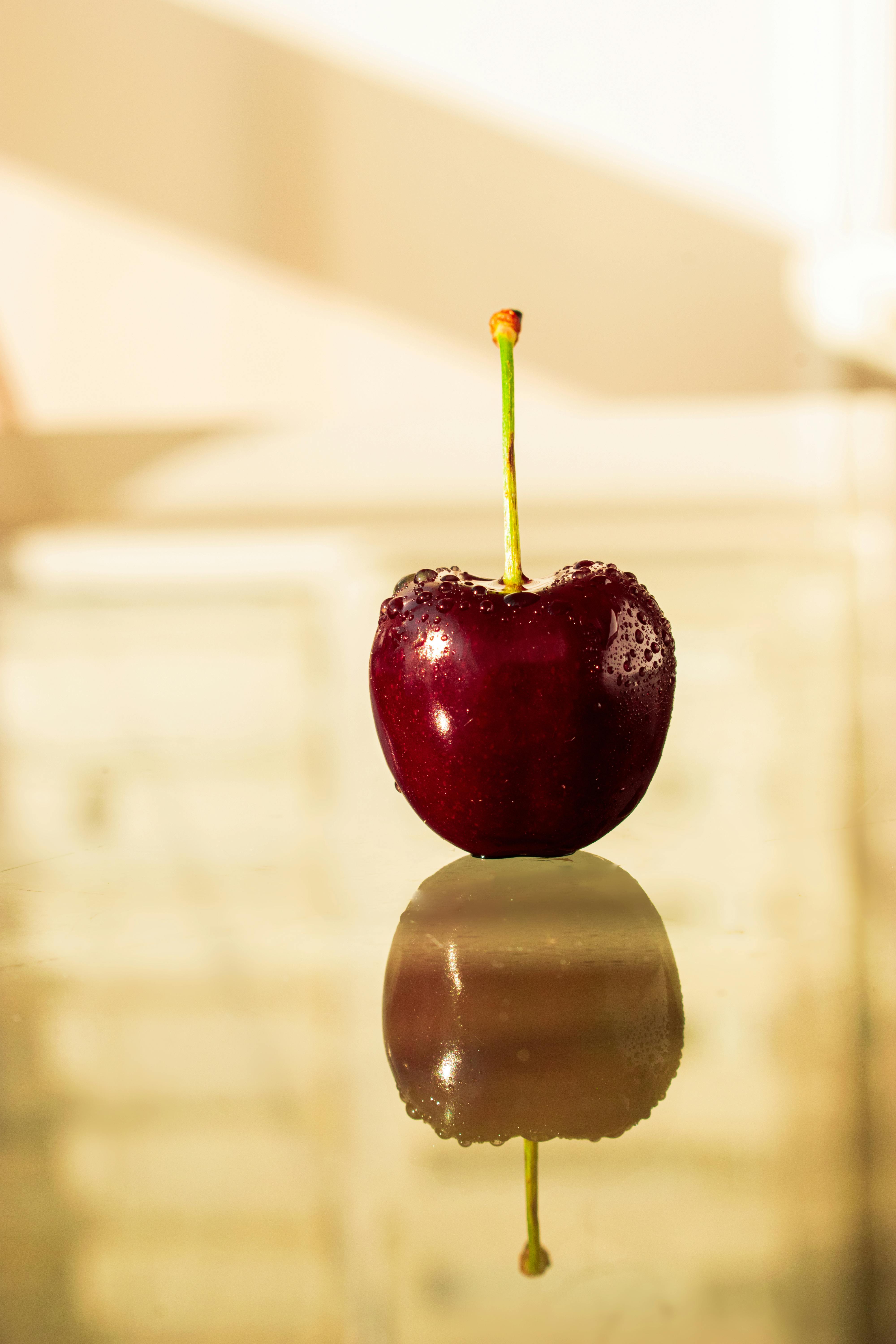 Close-Up Shot of a Cherry · Free Stock Photo