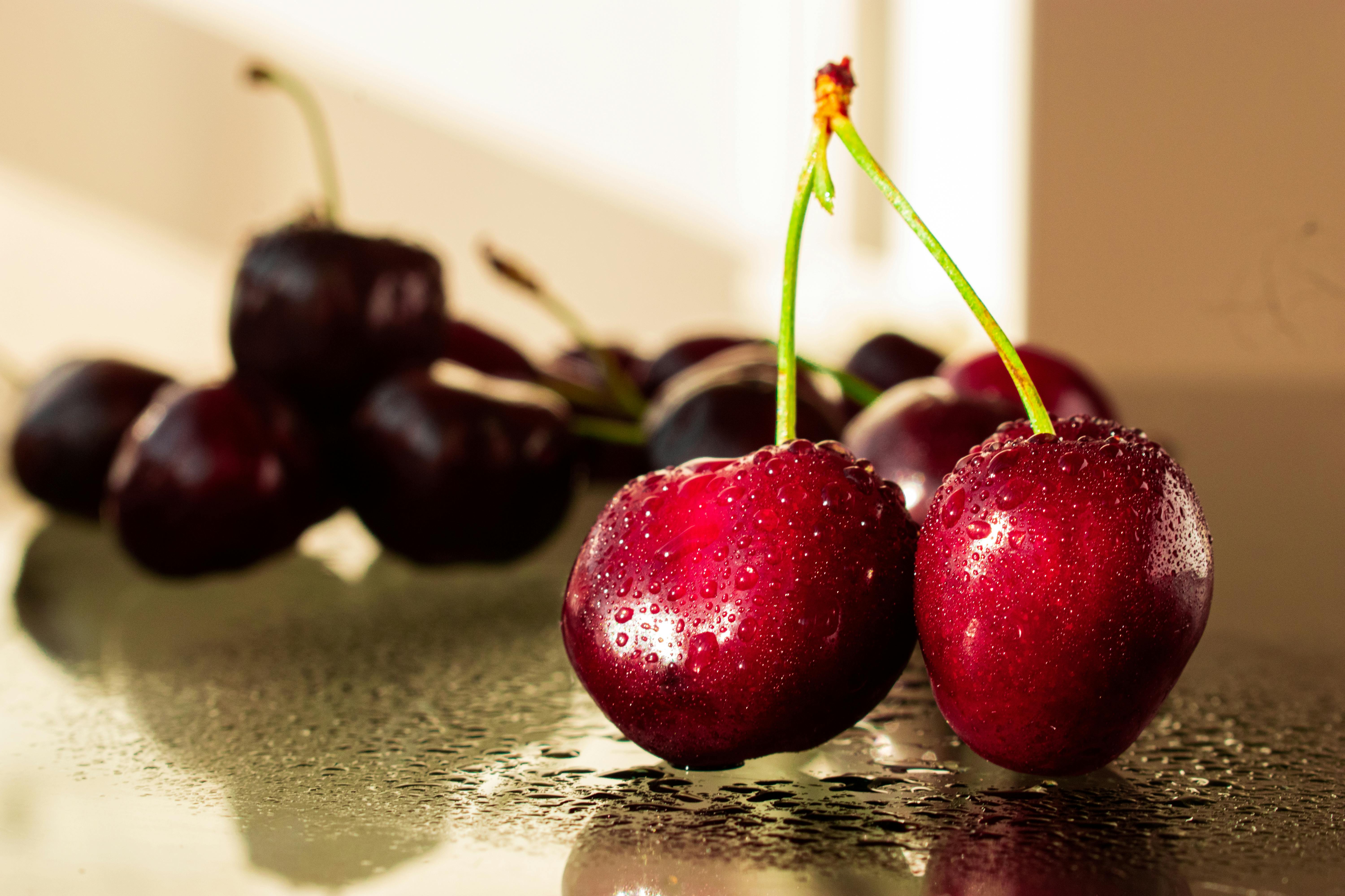 Close-Up Shot of Cherries · Free Stock Photo