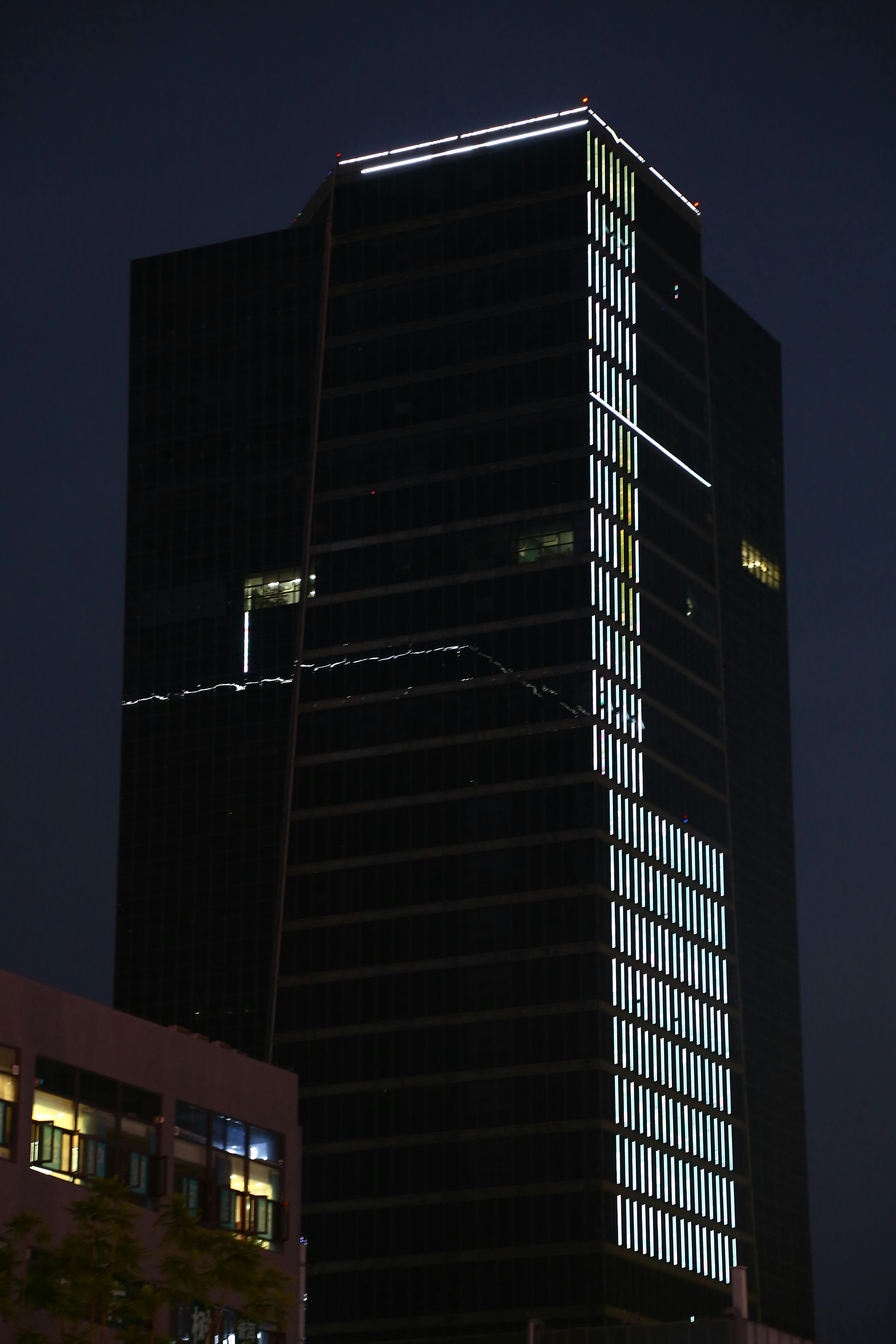 High-Rise Building at Night · Free Stock Photo