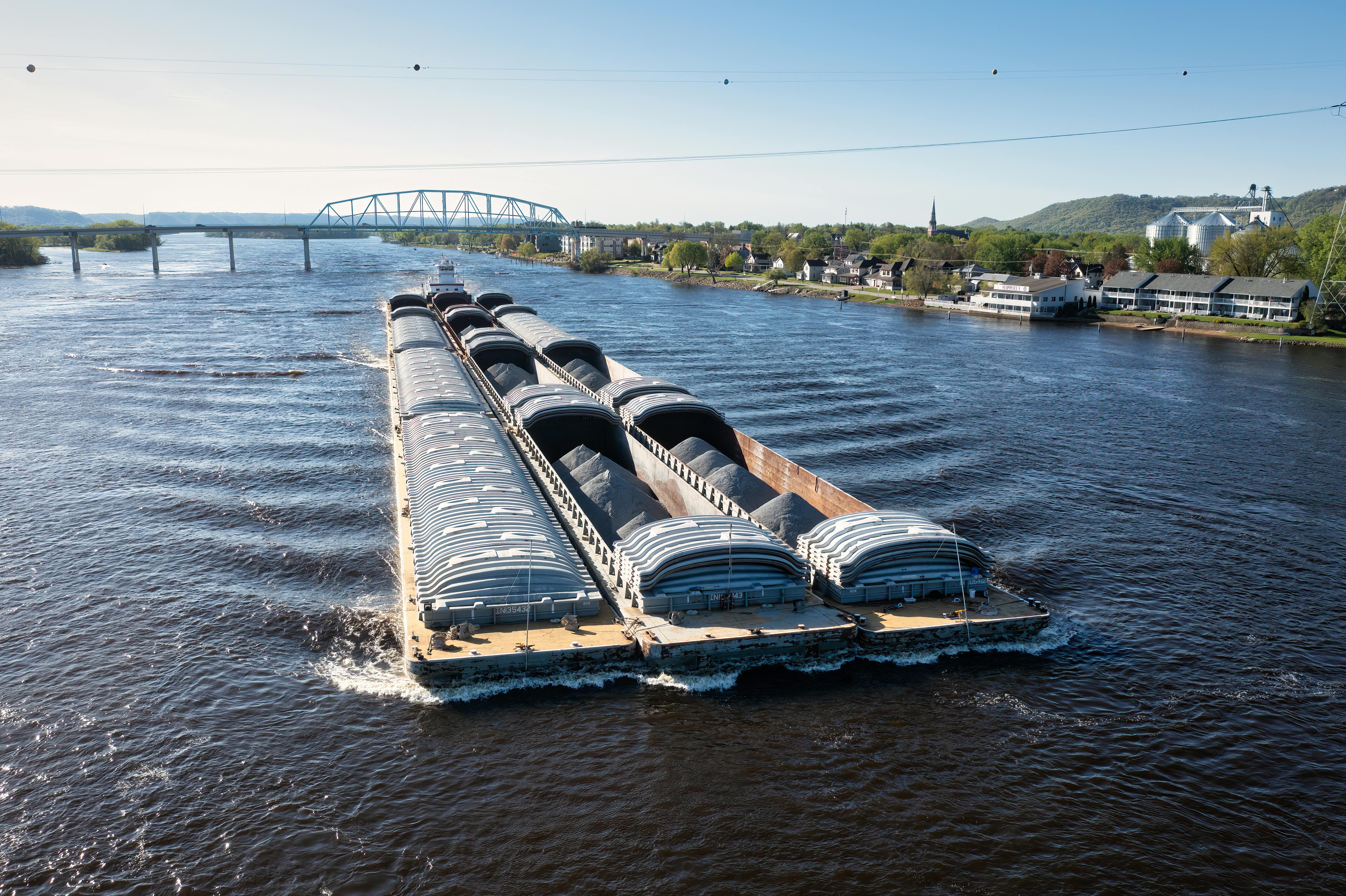 Transporting Sand in the River · Free Stock Photo