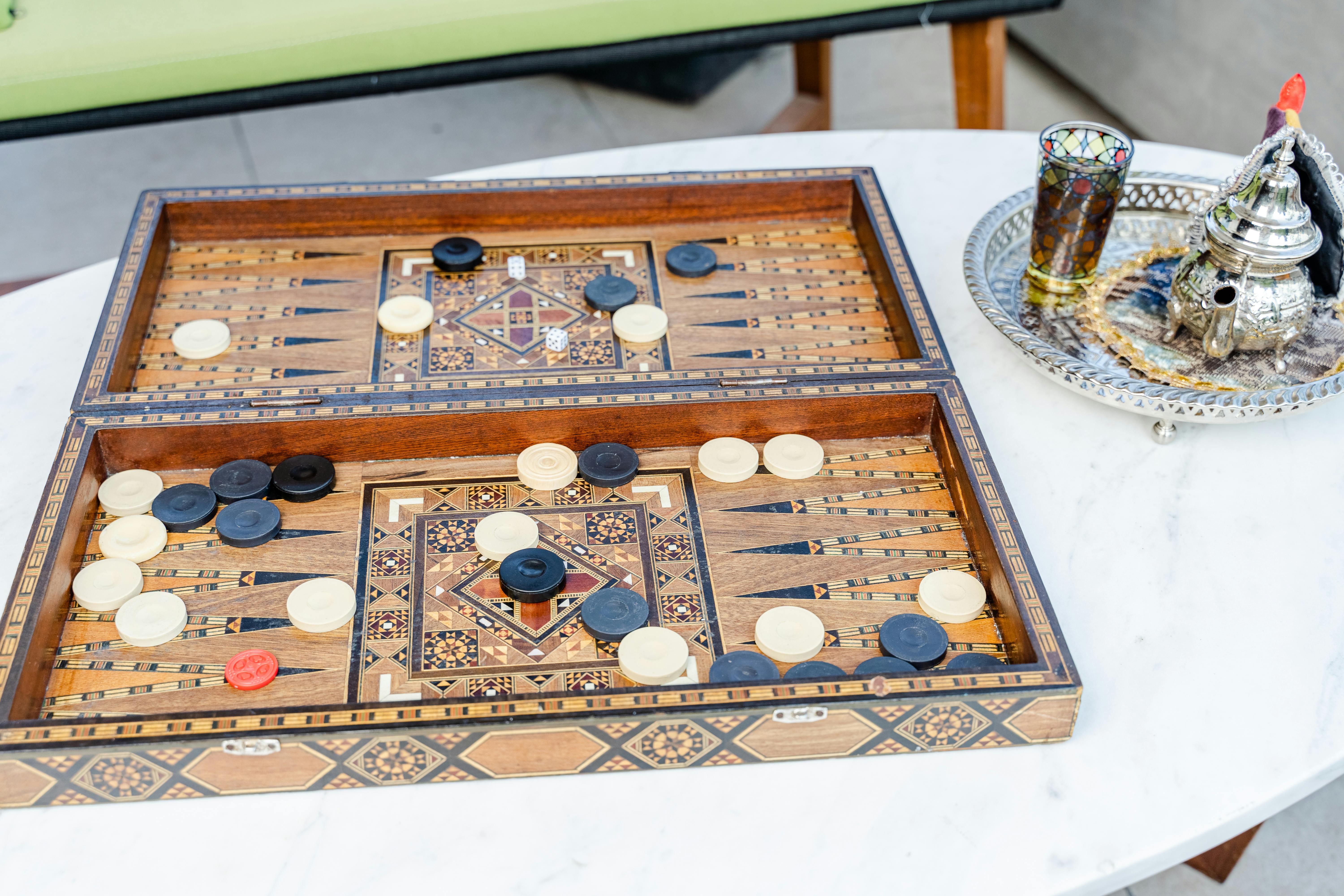 Brown Wooden Game on White Table · Free Stock Photo