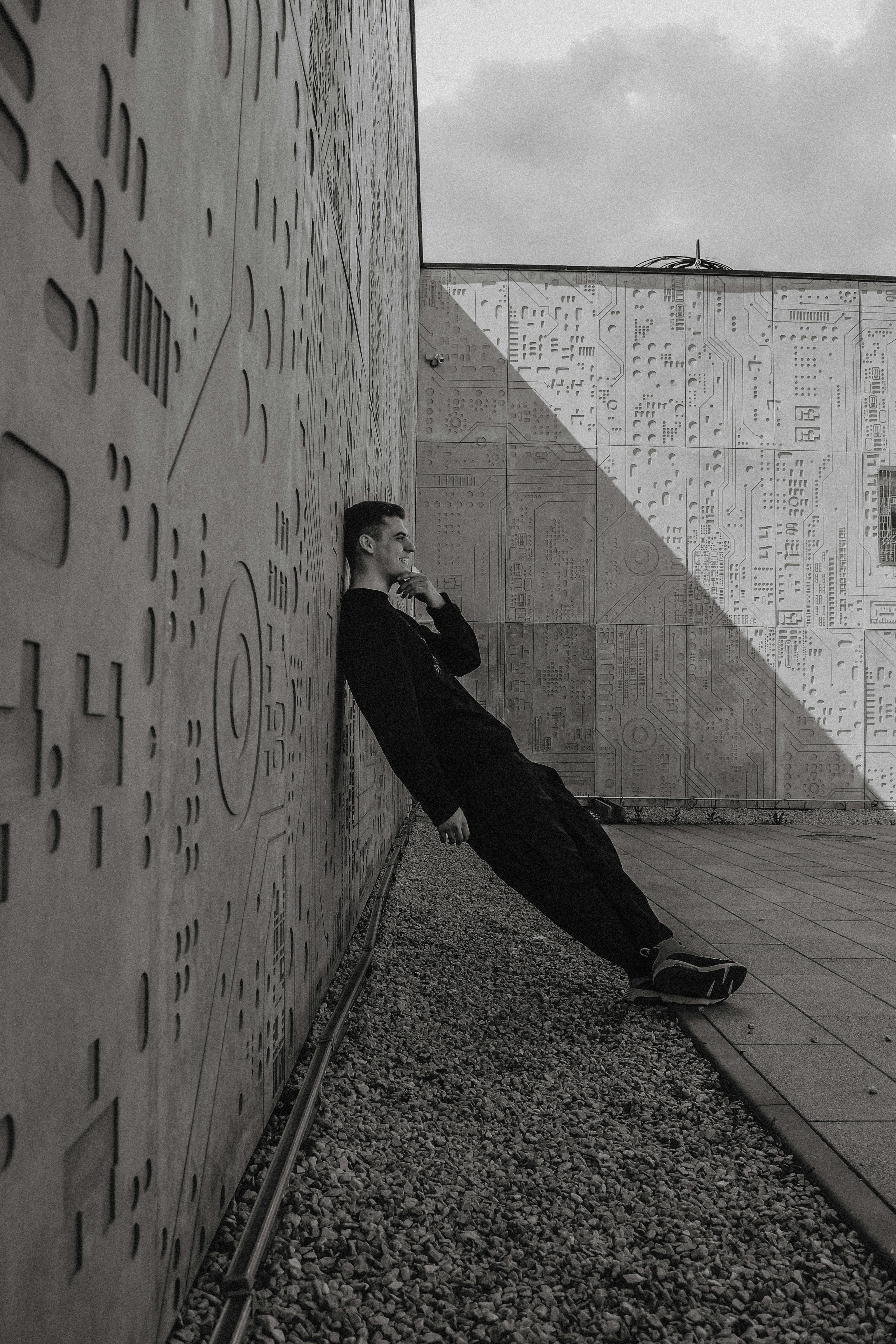 A Man Standing by a Wall · Free Stock Photo