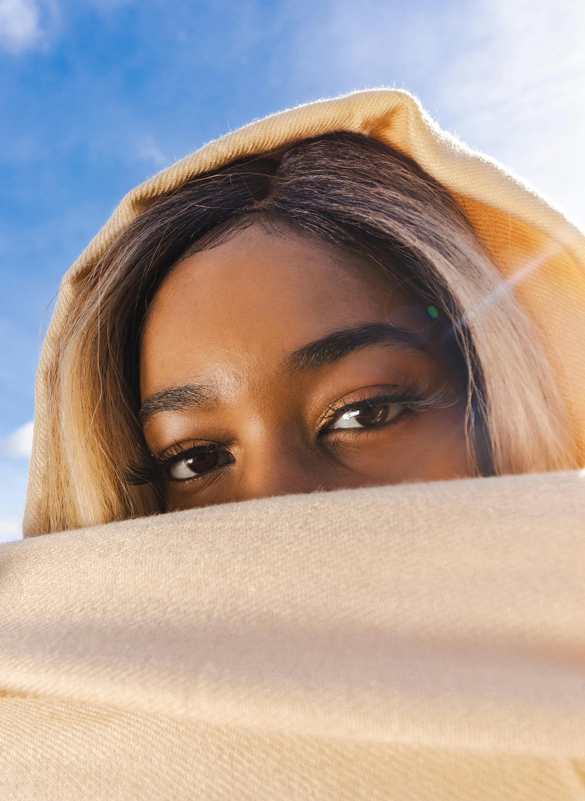 Close-Up Shot of a Woman Covering Her Face · Free Stock Photo
