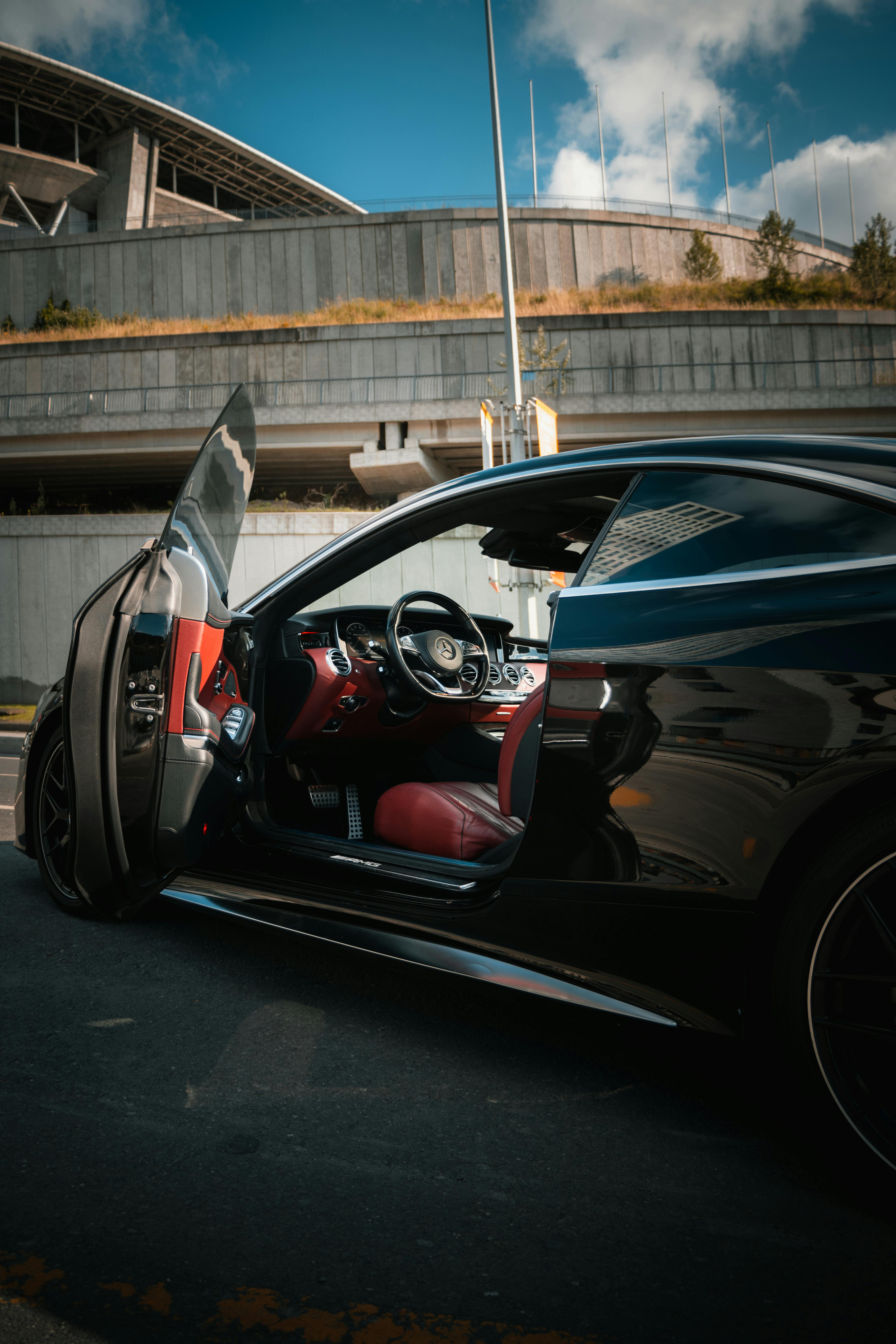 Close-up Shot of Fast Moving Car on the Road · Free Stock Photo