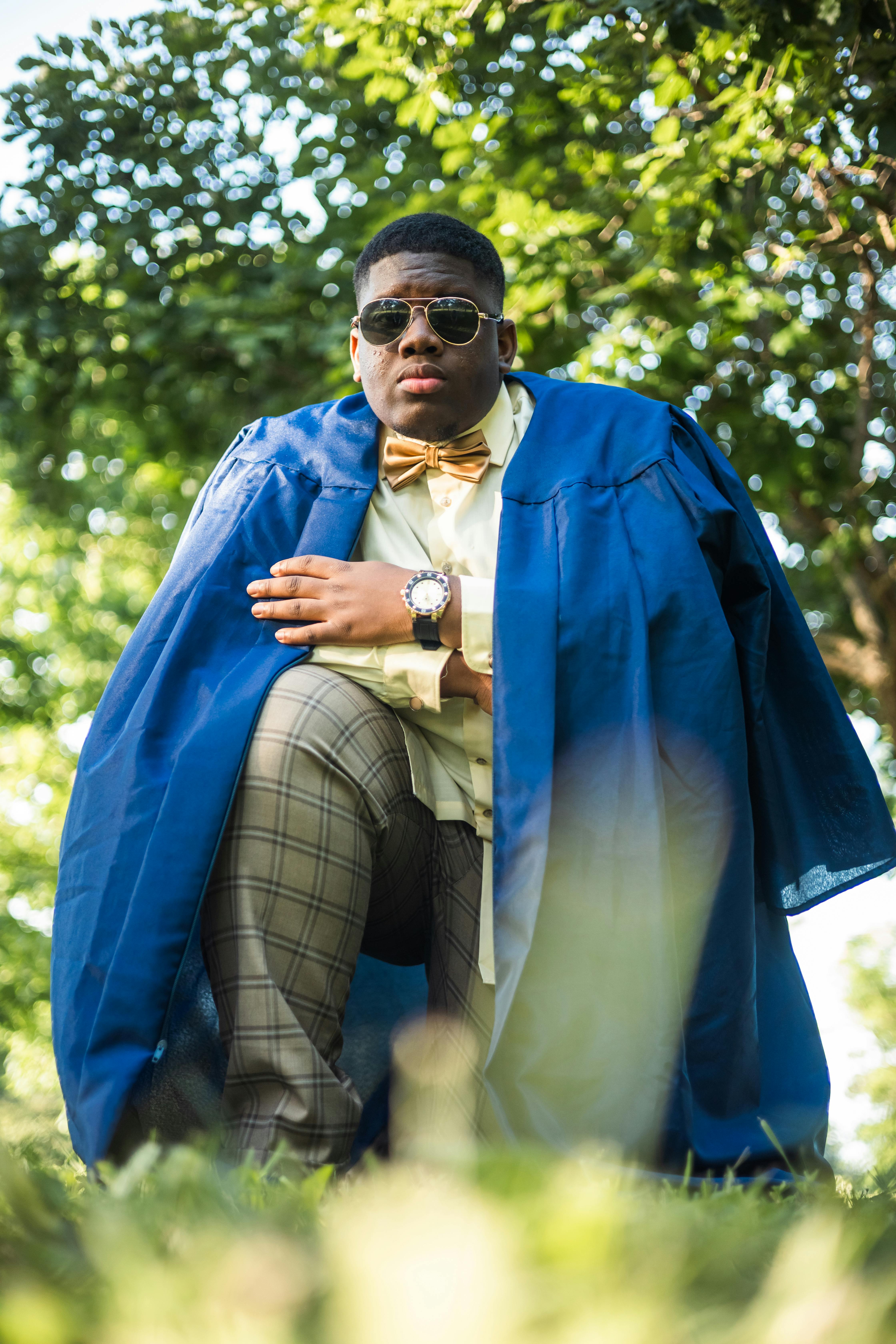 Man in a Graduation Gown · Free Stock Photo