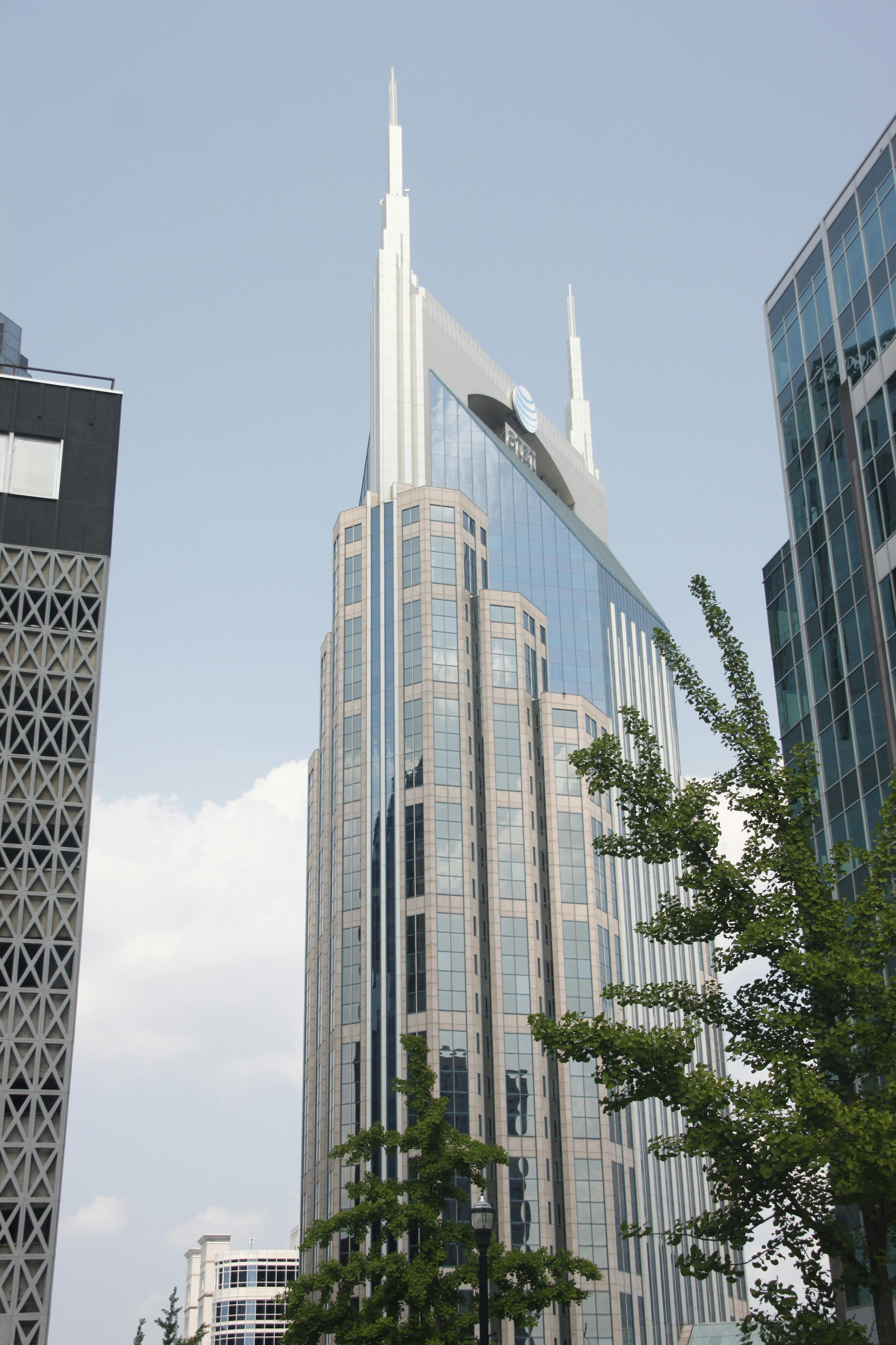 A High Rise Glass Building Under Blue Sky · Free Stock Photo