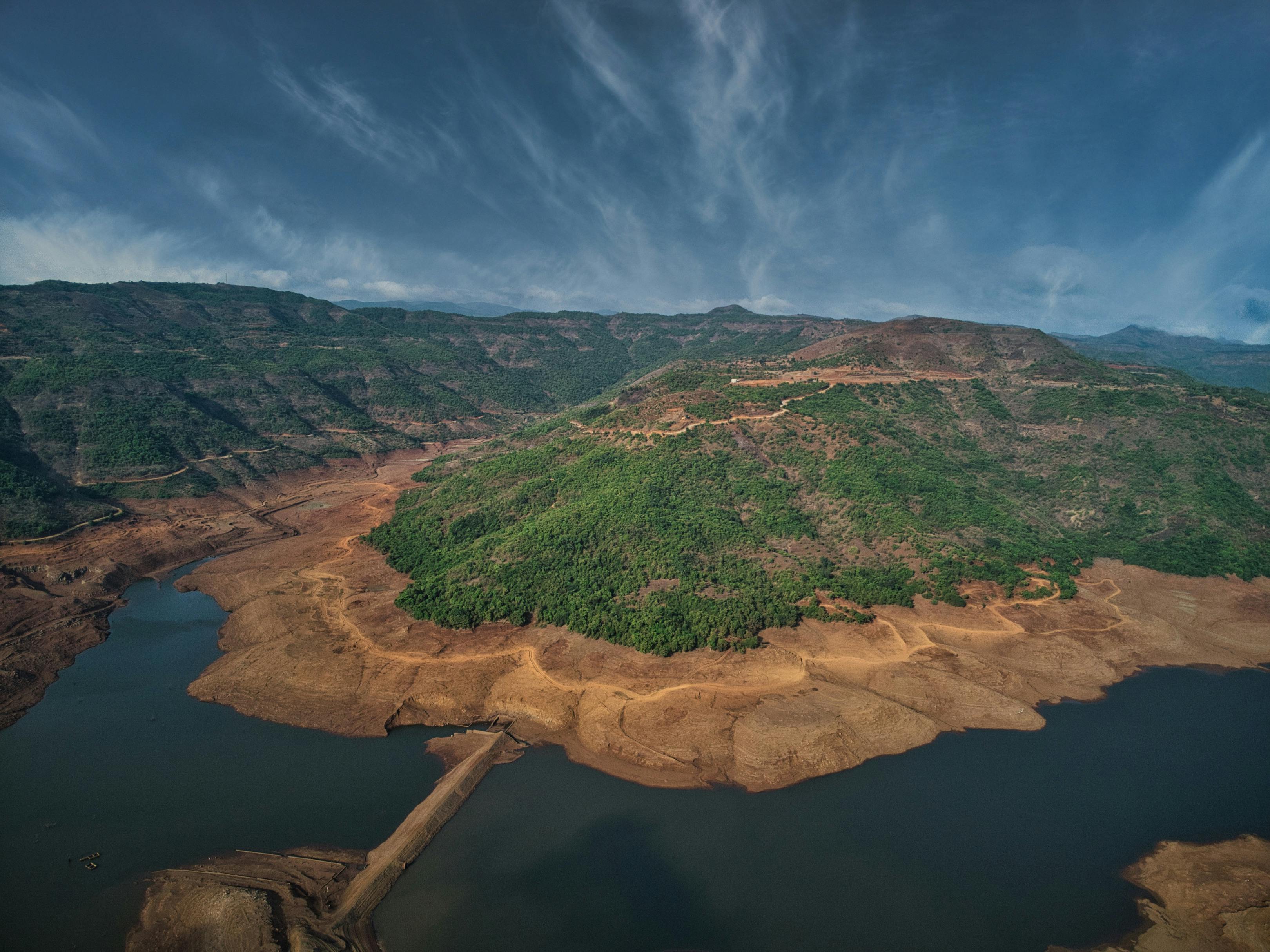 Hills around River · Free Stock Photo