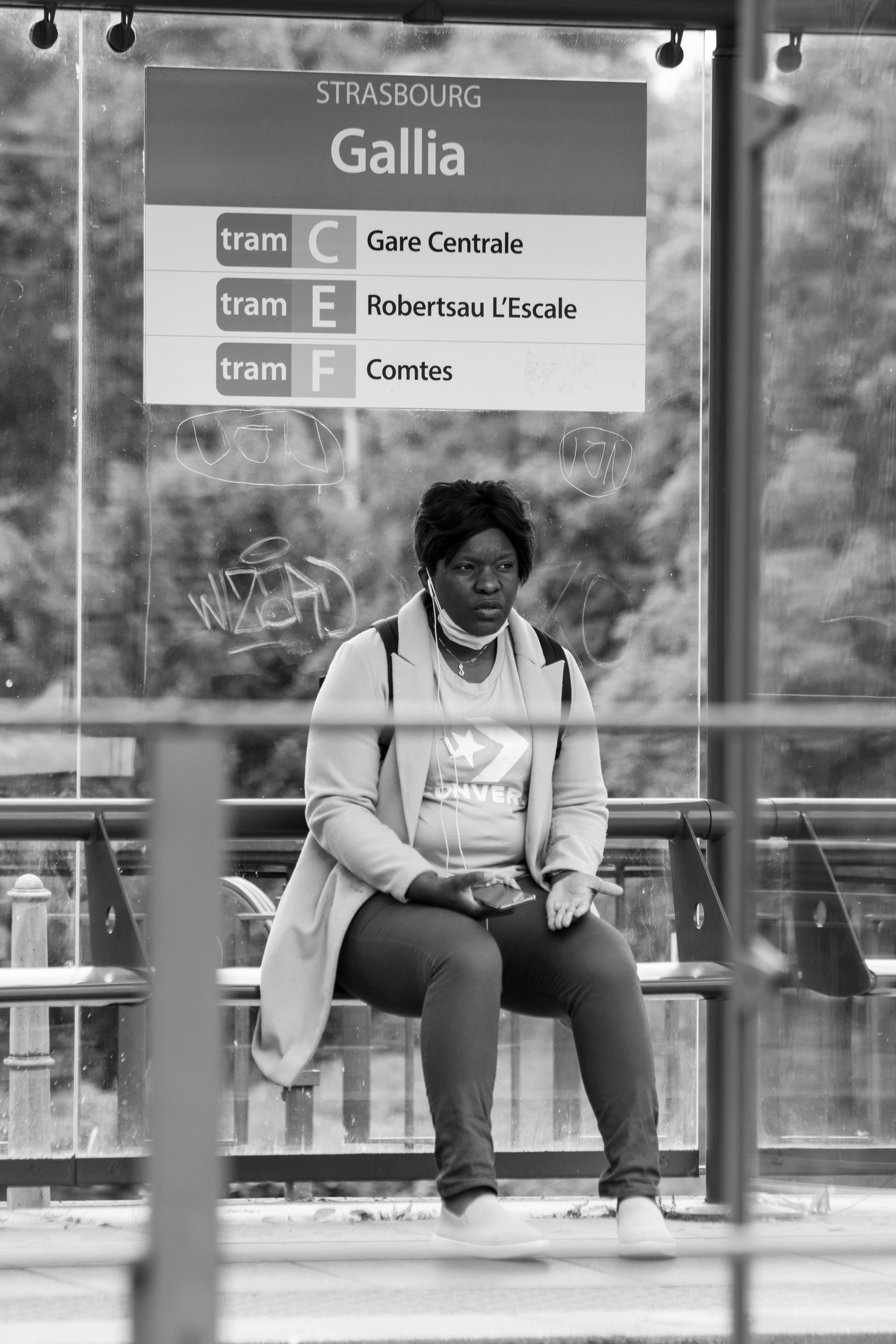 Woman Sitting on Railing · Free Stock Photo