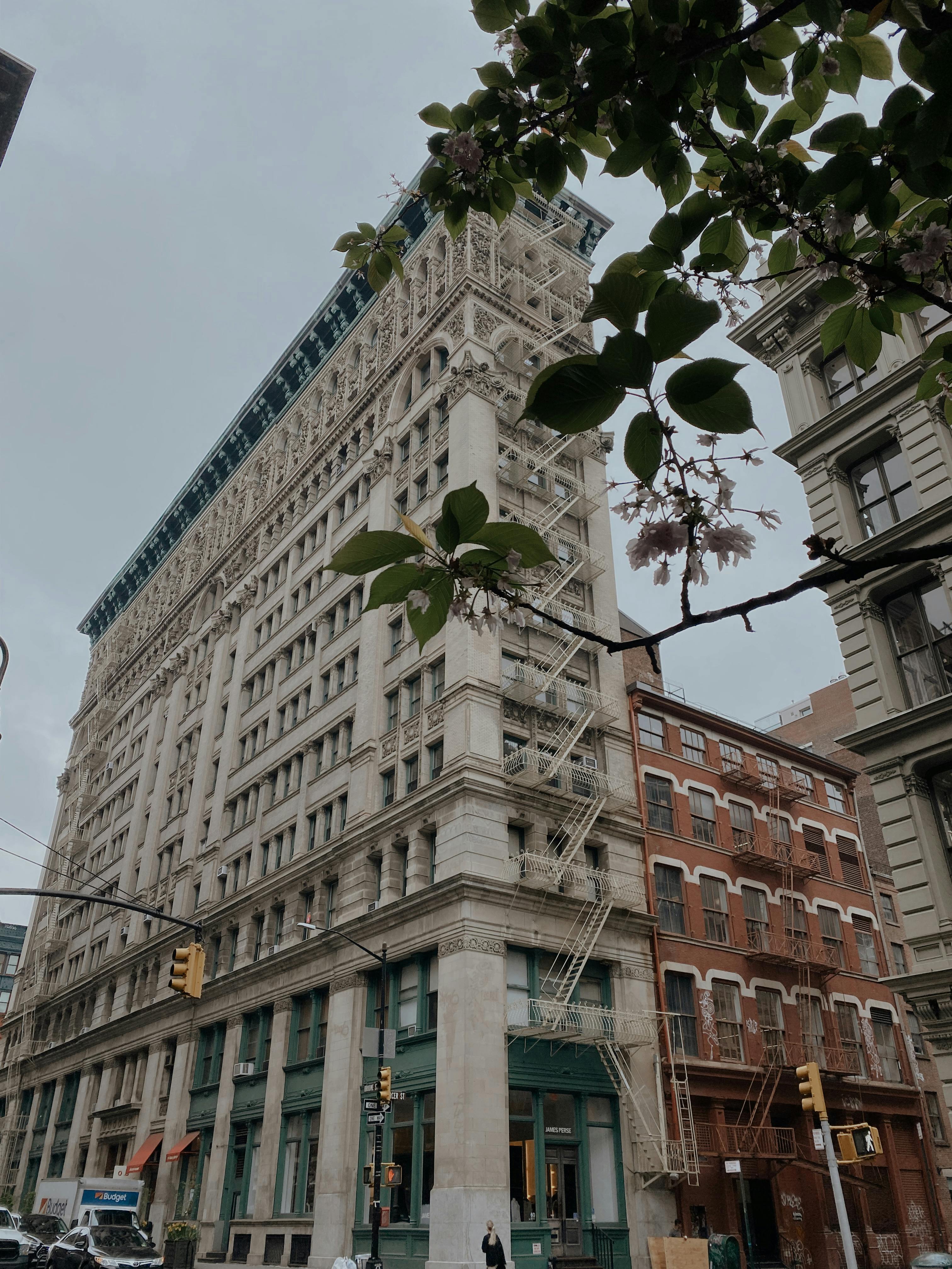 Low Angle View of Narrow Building · Free Stock Photo