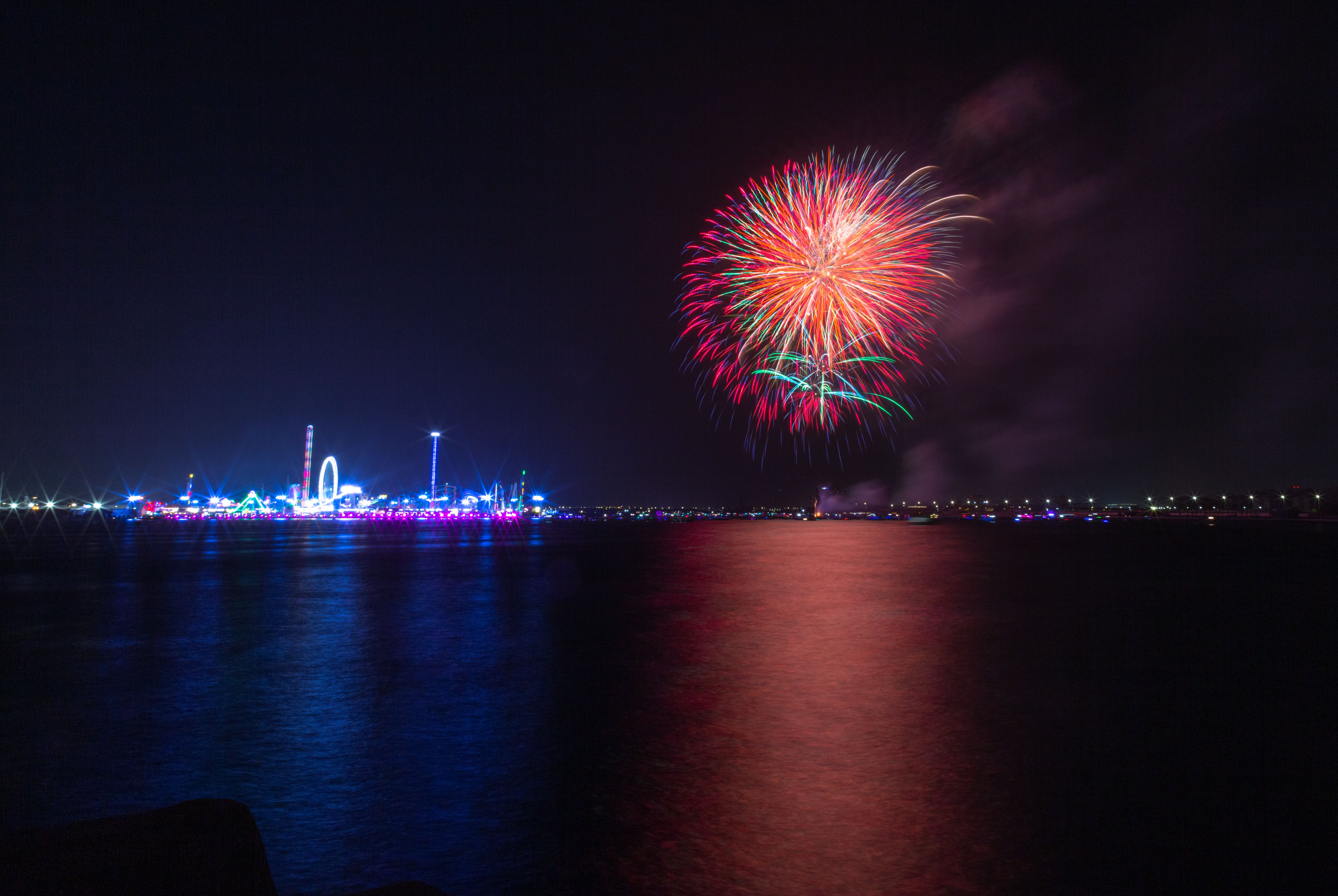 Silhouette of Building with Fireworks Display Background · Free Stock Photo