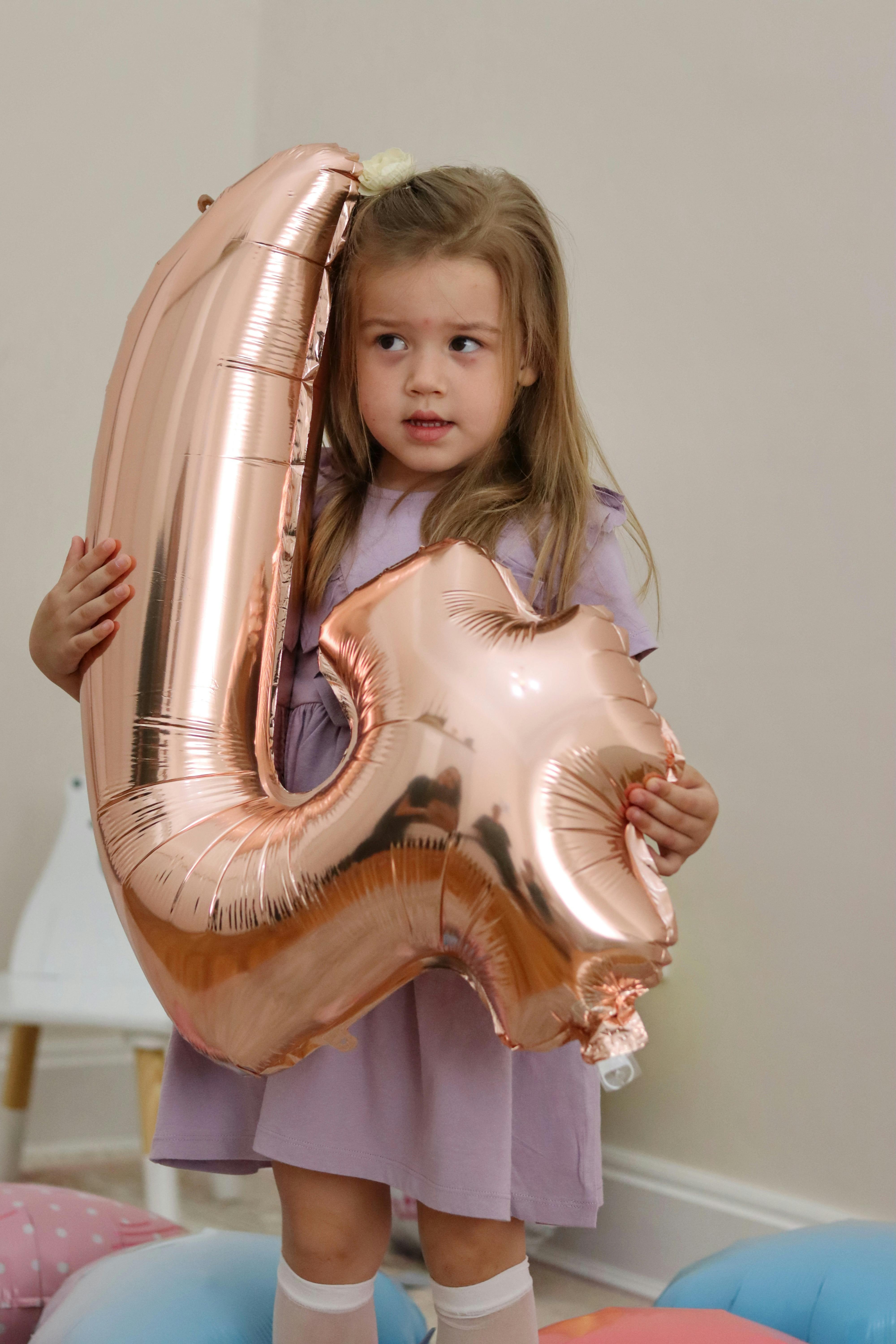 Girl with Birthday Balloon · Free Stock Photo