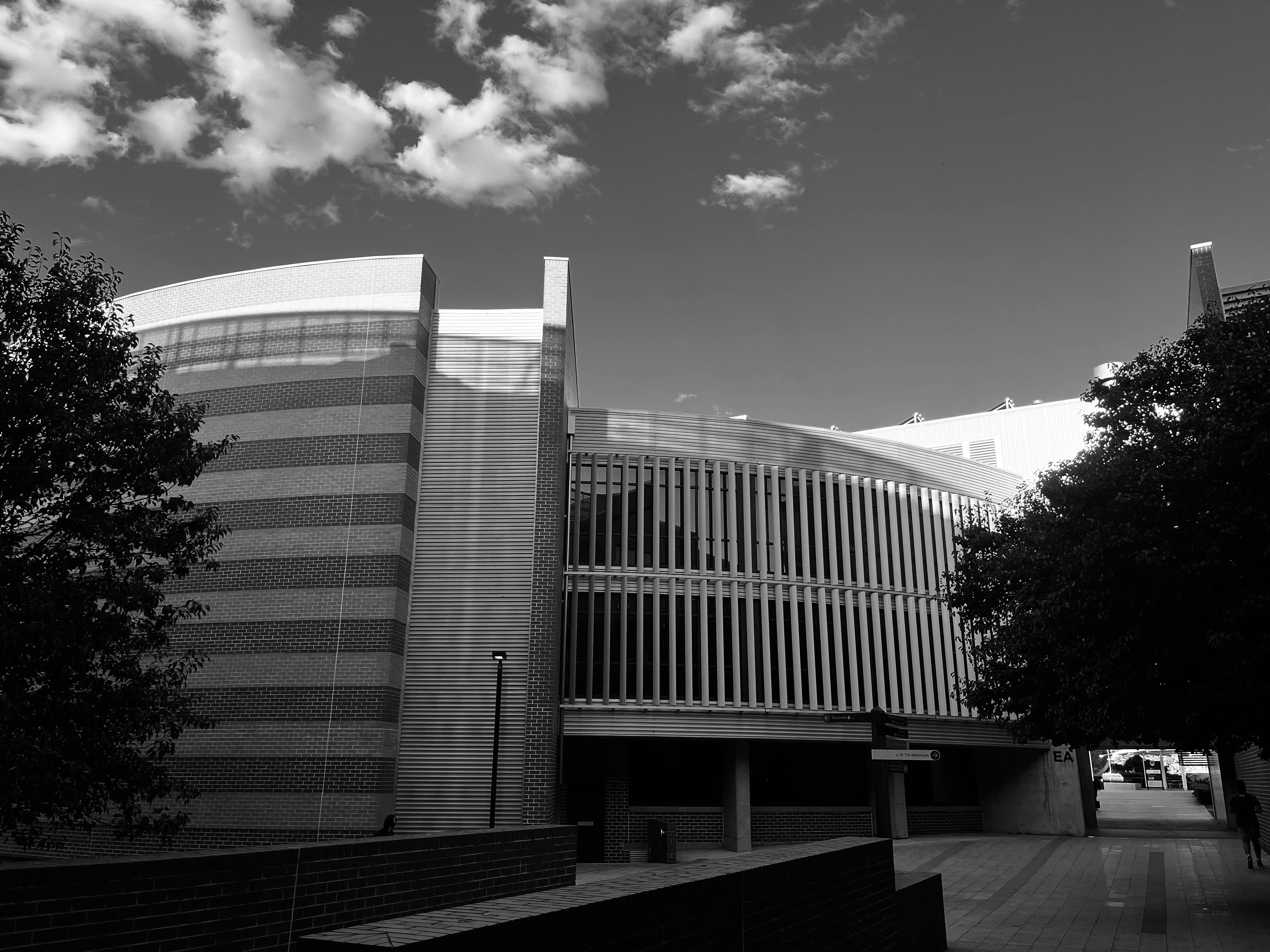 Grayscale Photo of a Building · Free Stock Photo