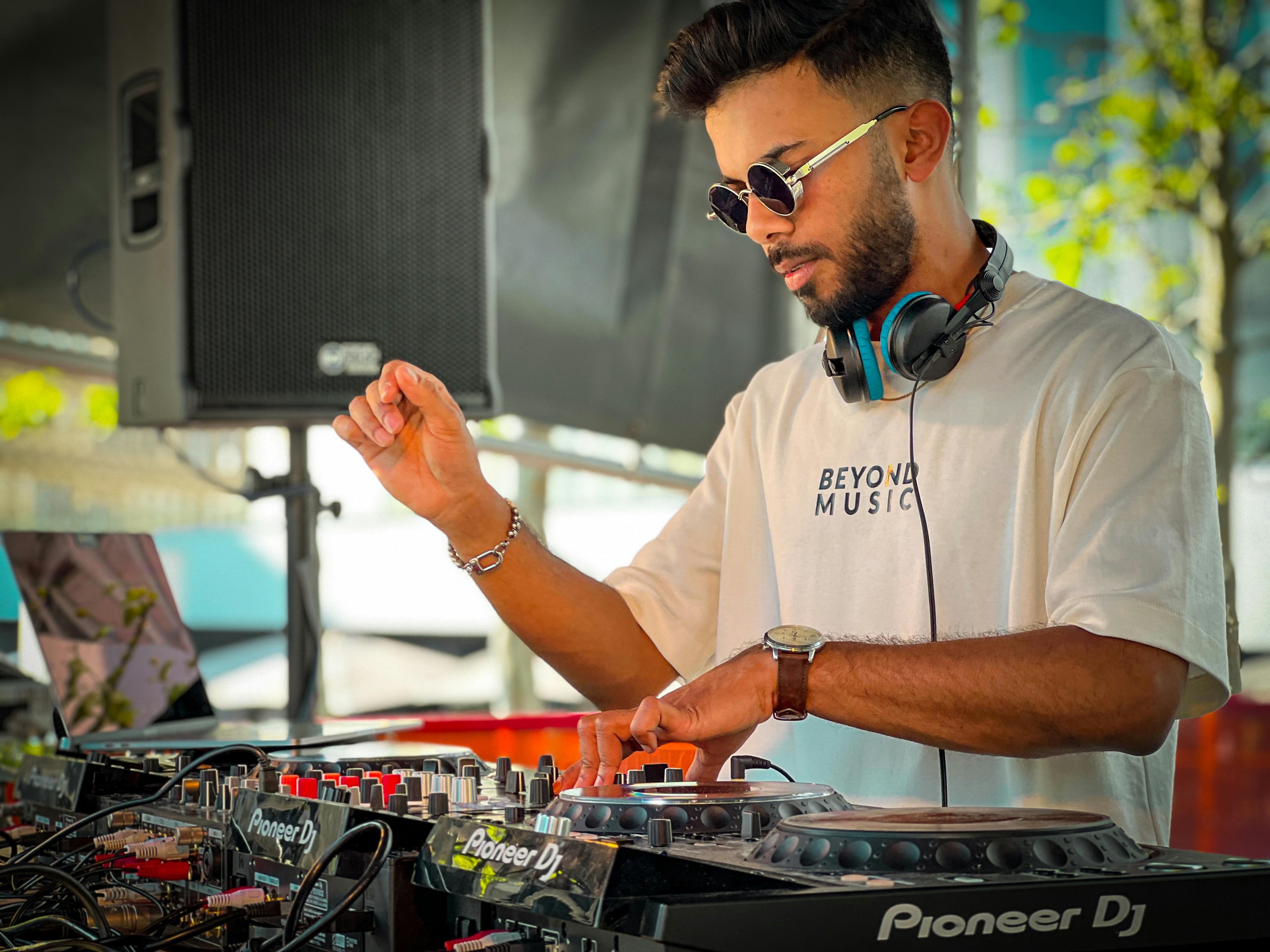 Photo of Disc Jockey on Turntables · Free Stock Photo