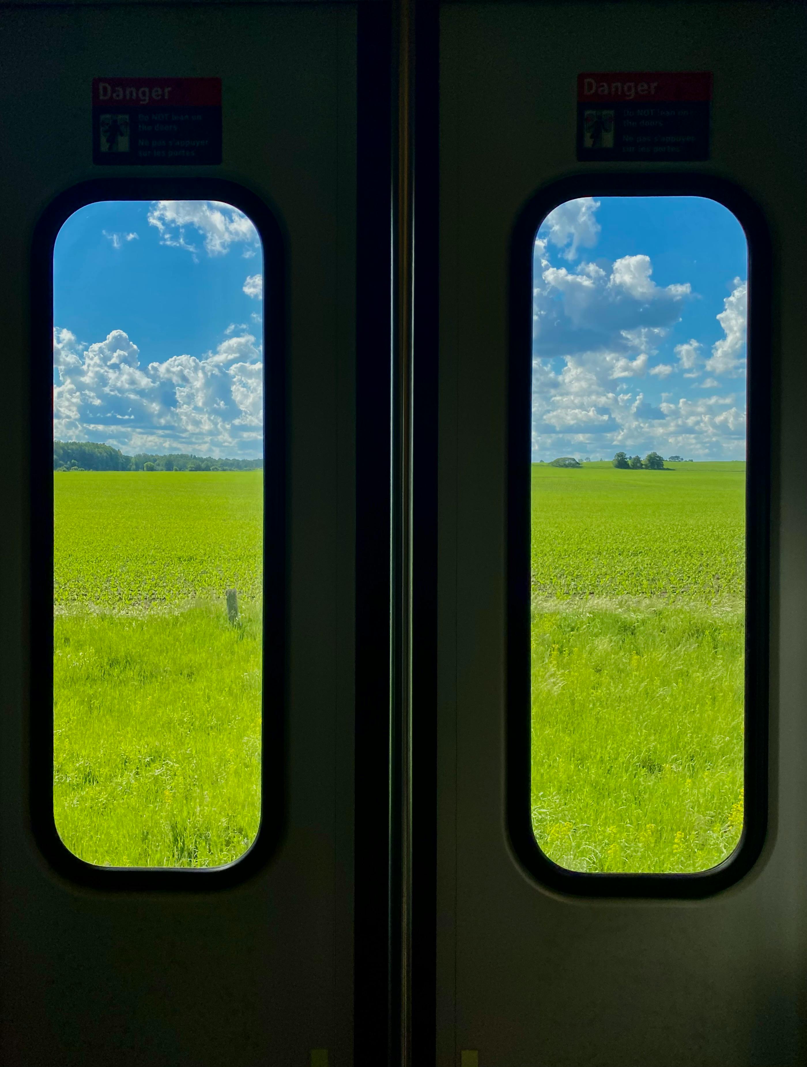 Glass Panels on Train Door · Free Stock Photo