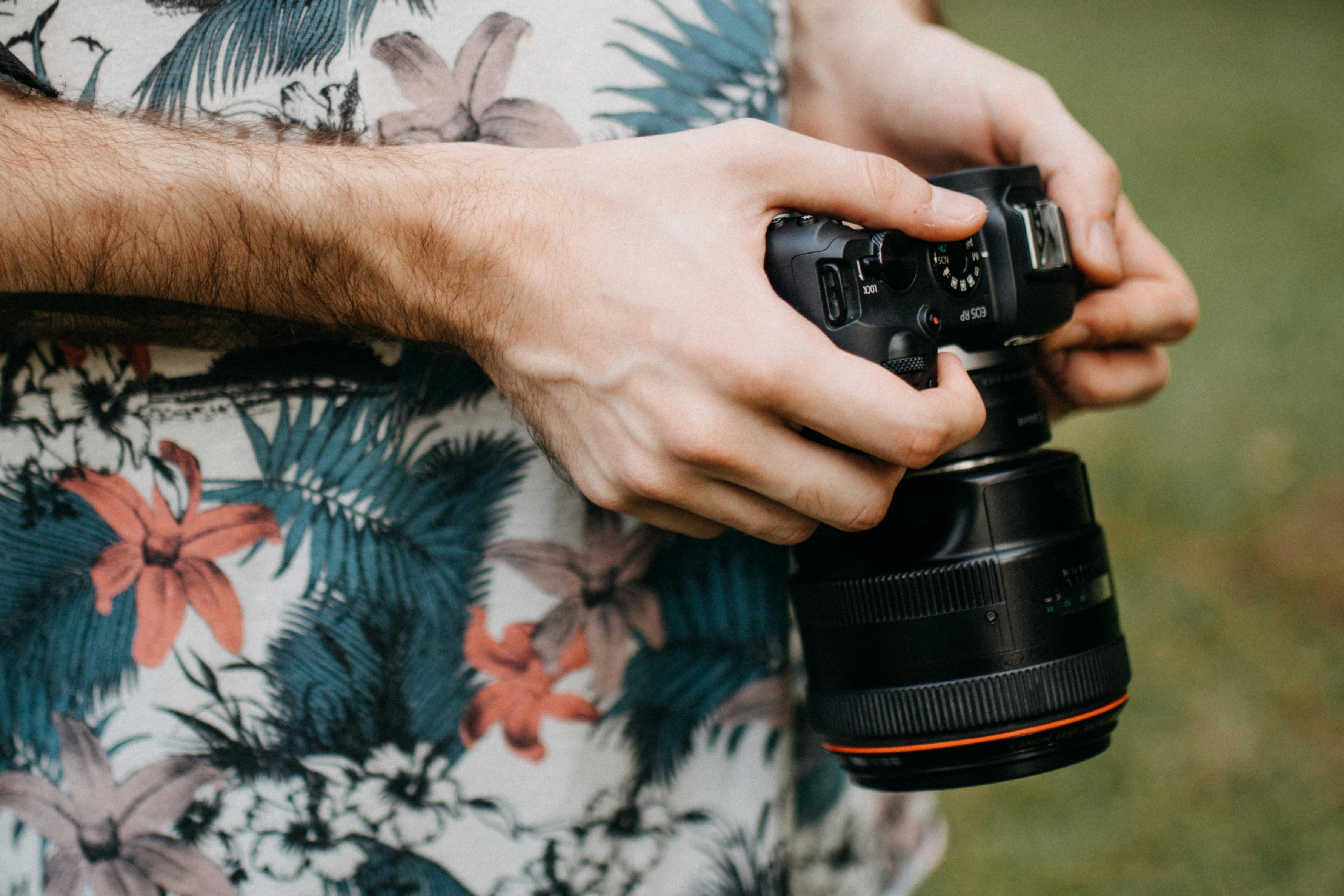 Hand Holding Camera · Free Stock Photo