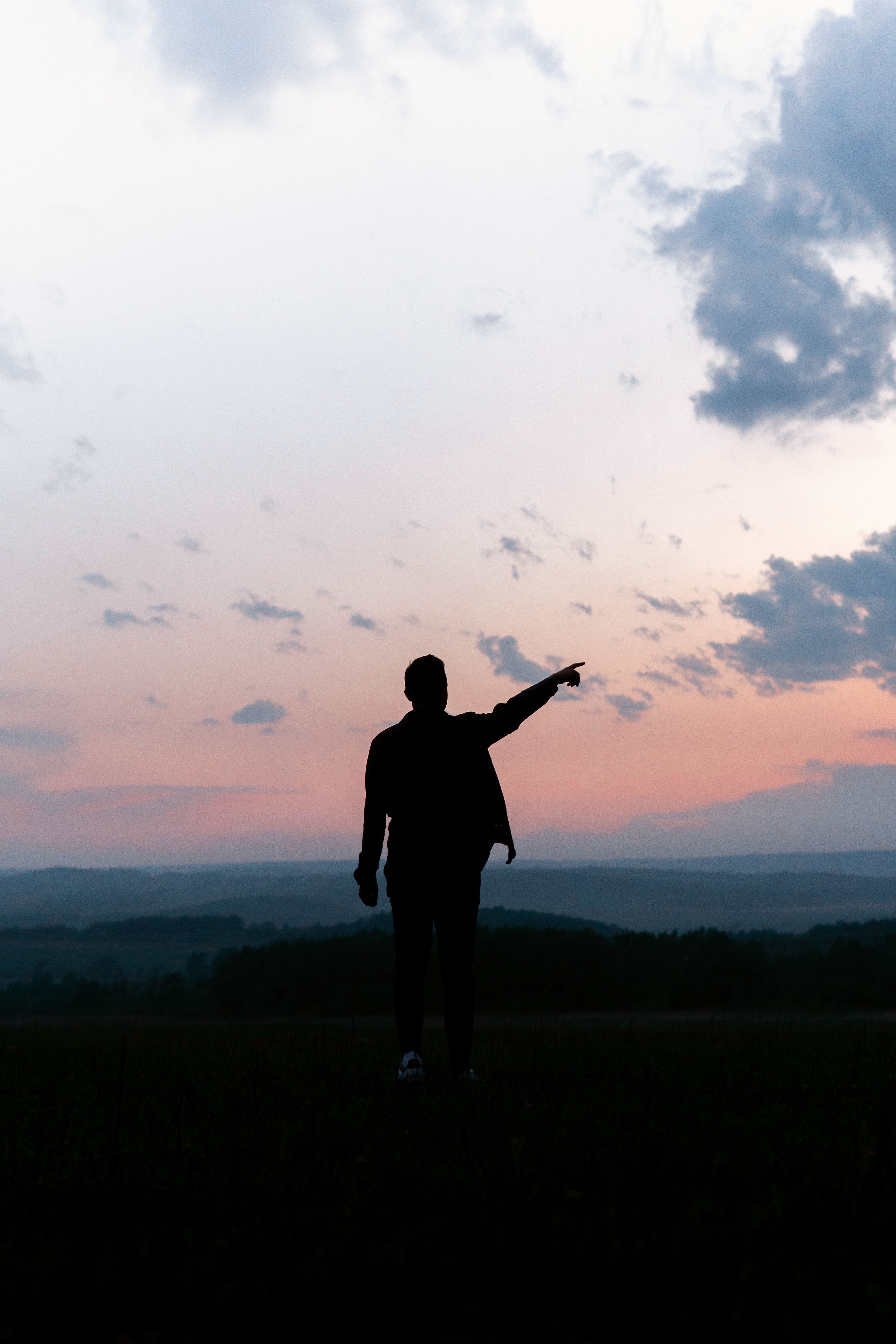 Silhouette of a Man at Dusk · Free Stock Photo