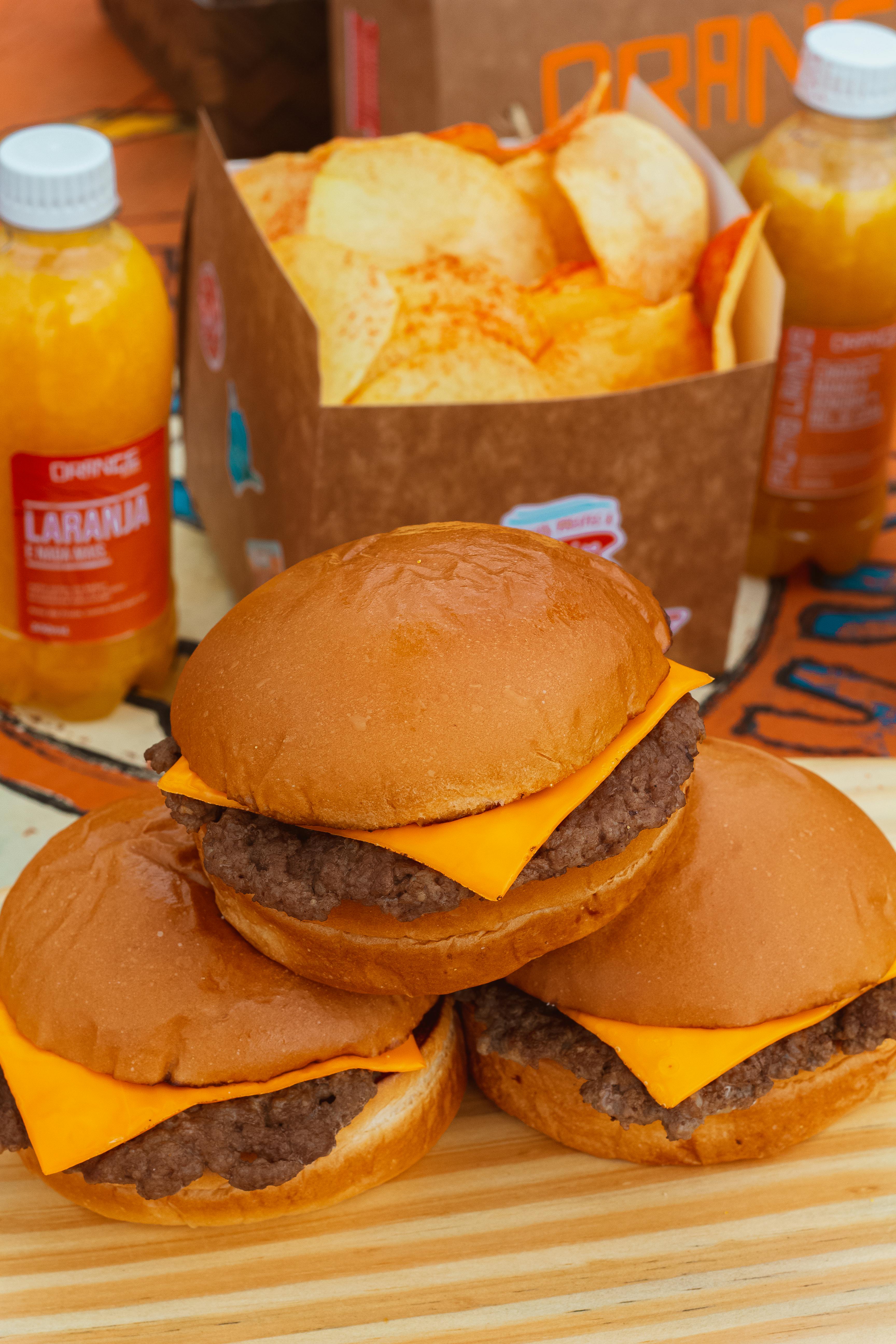 Burgers and Chips on Table · Free Stock Photo